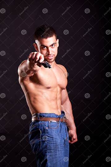 Bodybuilder with gun stock photo. Image of aggressive - 32442056
