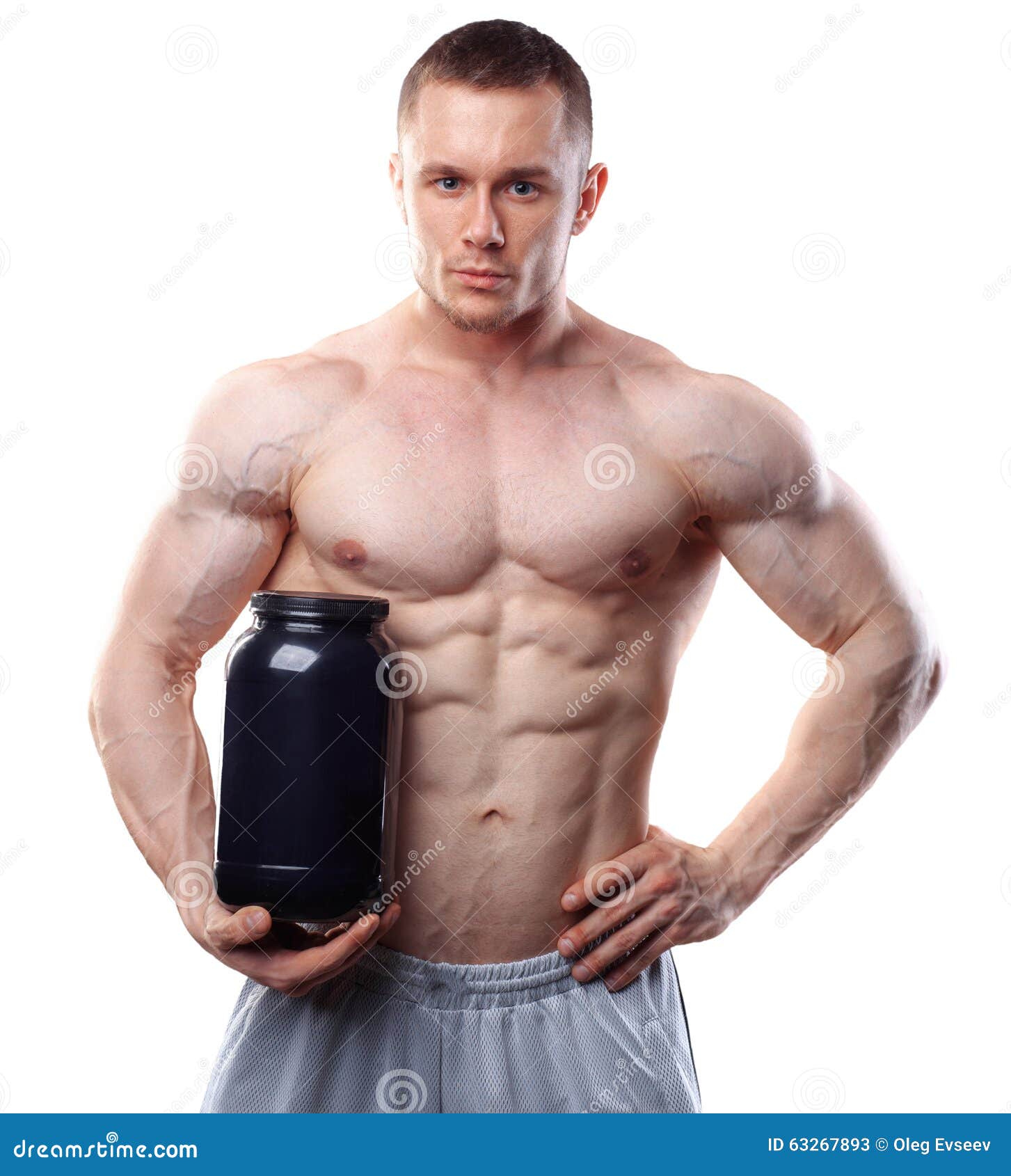Bodybuilder Holding a Black Plastic Jar with Whey Stock Image - Image ...