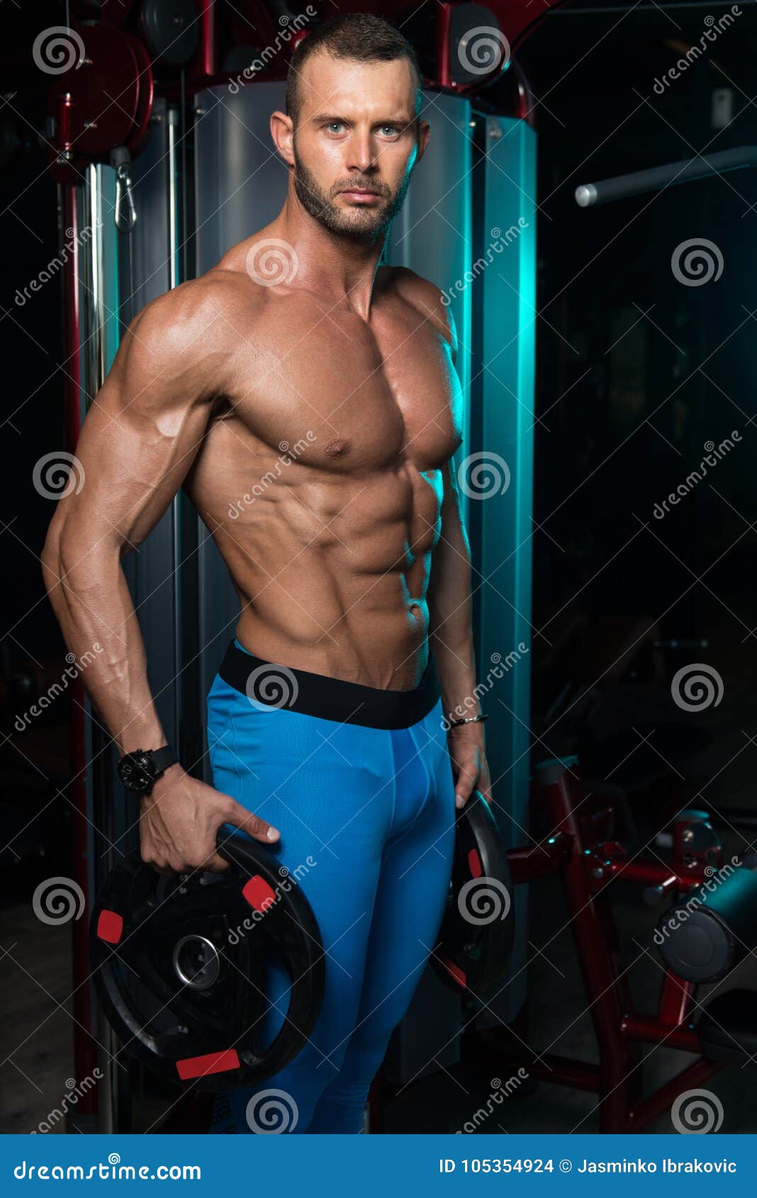 Bodybuilder Holding Weights in Hand Stock Photo - Image of exercising ...
