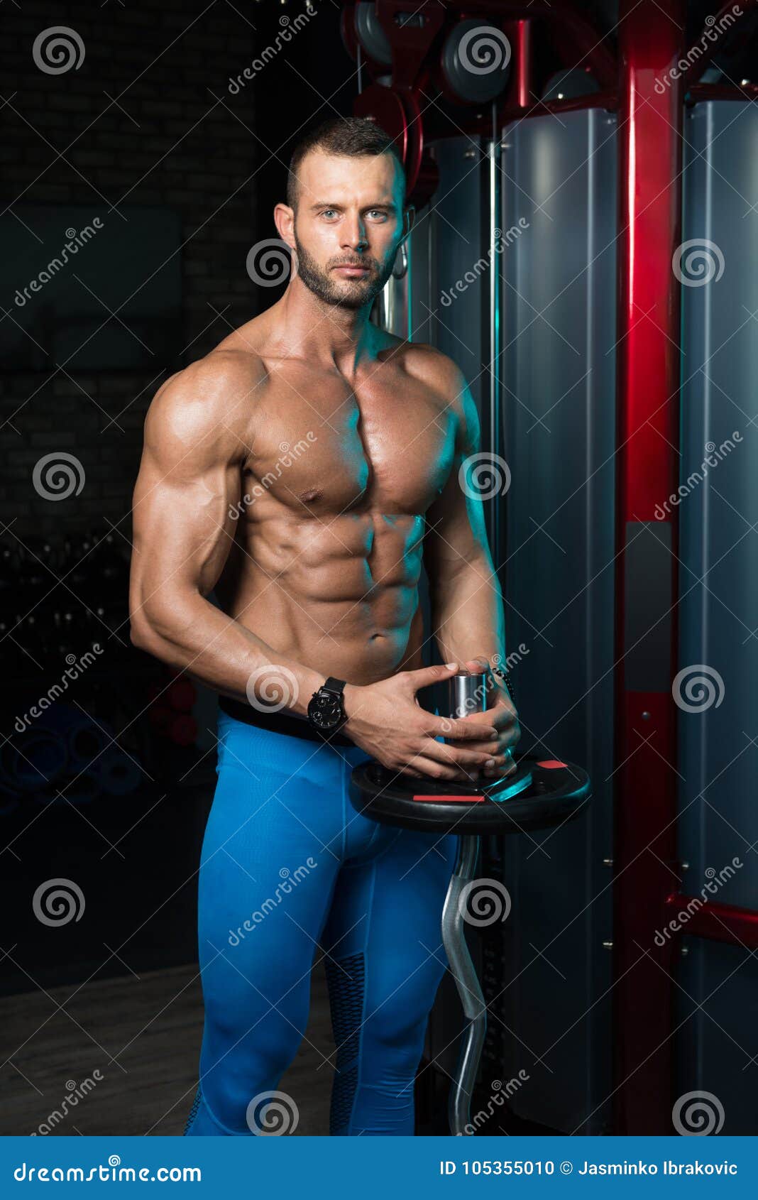 Bodybuilder Holding Weights in Hand Stock Photo - Image of equipment ...