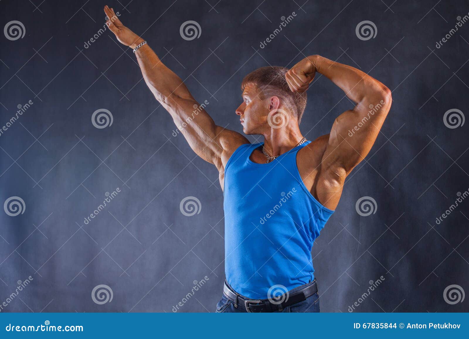Bodybuilder in Jeans and a Blue T-shirt Stock Photo - Image of athlete ...