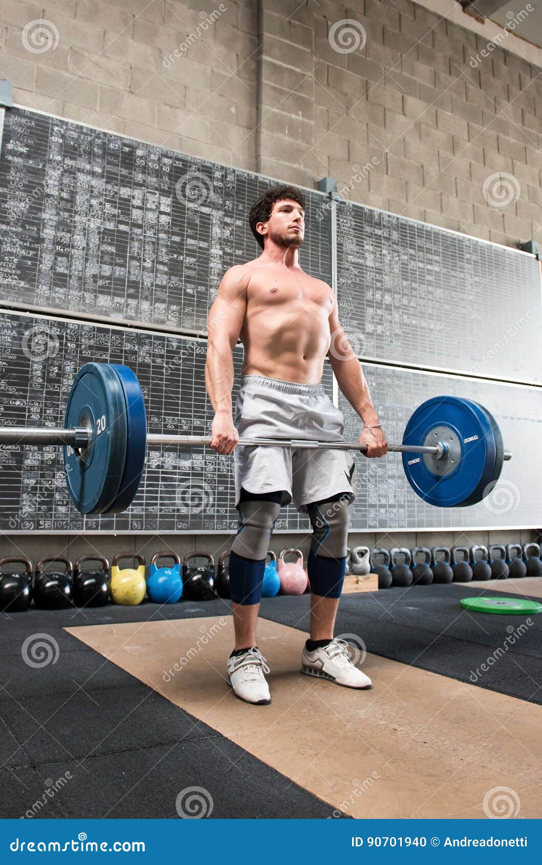 Bodybuilder Lifting Heavy Barbell Weights Stock Photo - Image of ...
