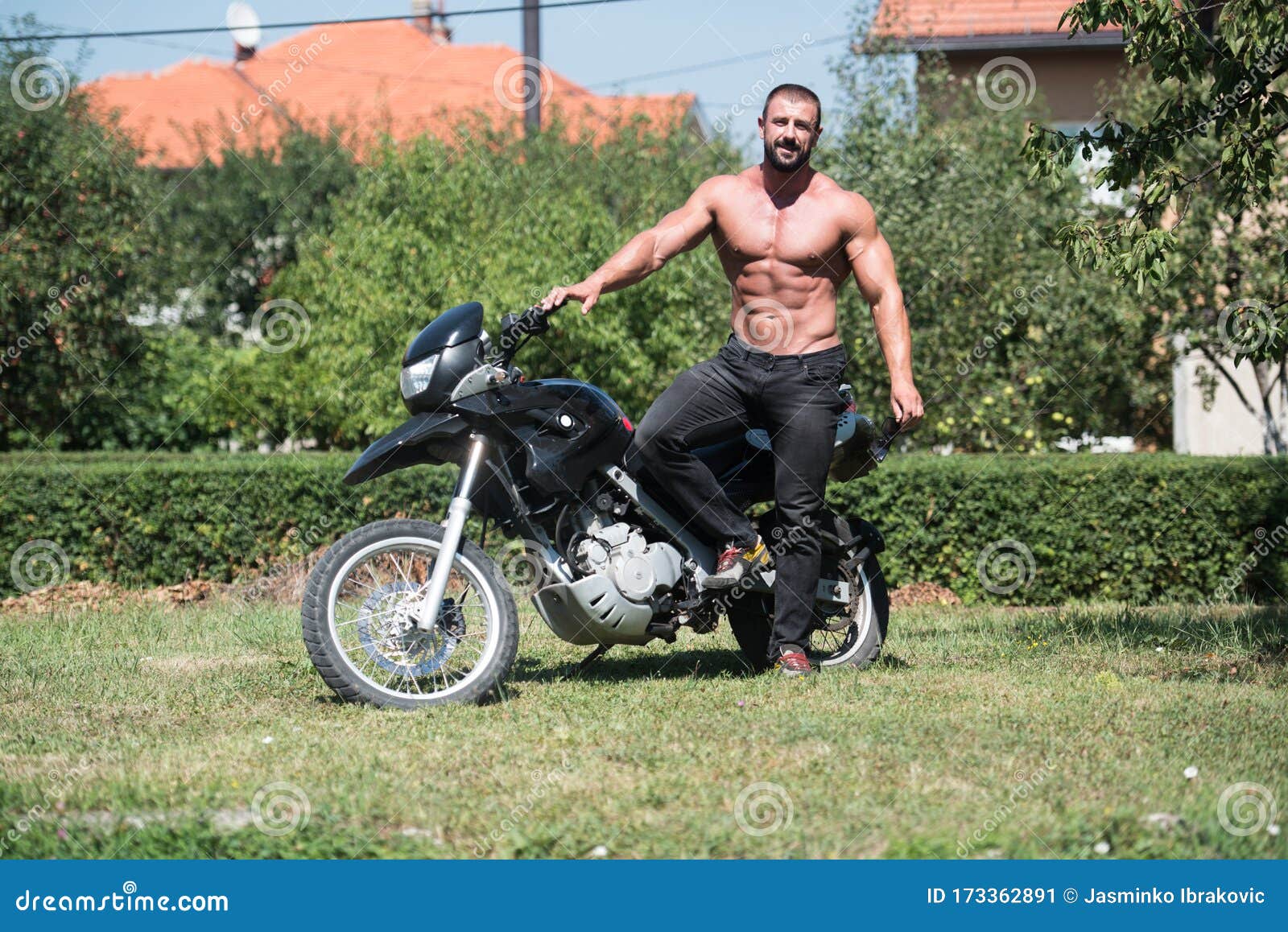 Bodybuilder and Motorcycle stock image. Image of male - 173362891
