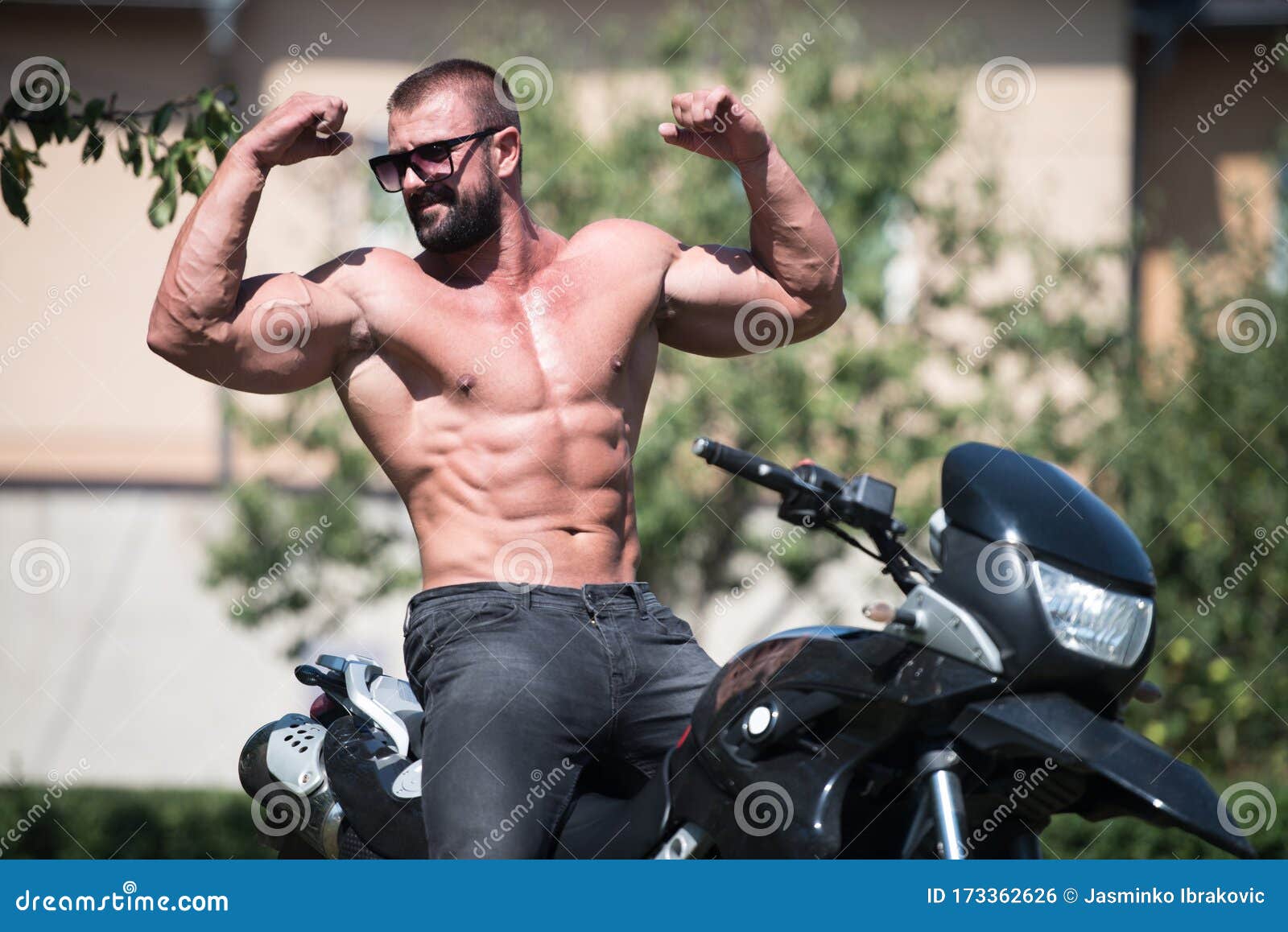 Bodybuilder and Motorcycle stock photo. Image of helmet - 173362626