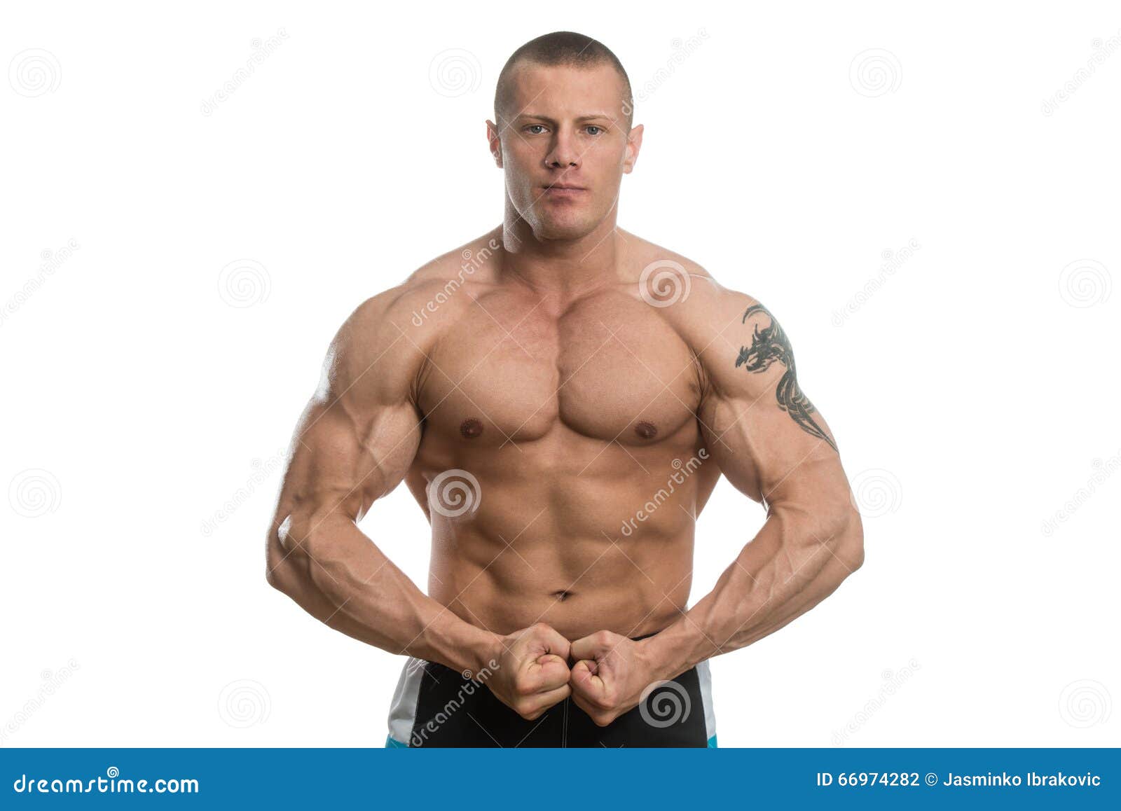 Bodybuilder Performing Most Muscular Pose Over White Background Stock ...
