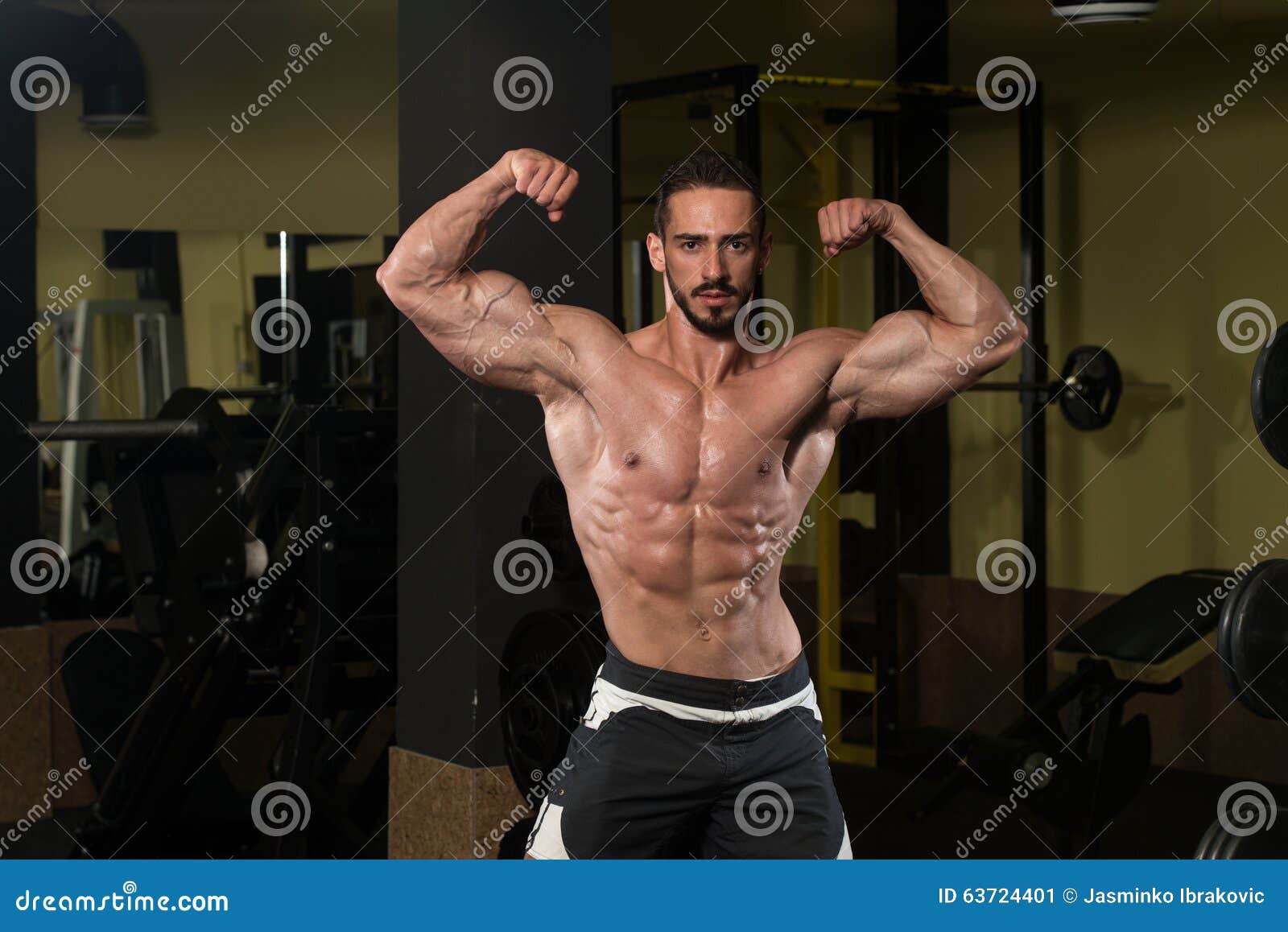 Bodybuilder Performing Rear Double Biceps Pose Stock Image - Image of ...
