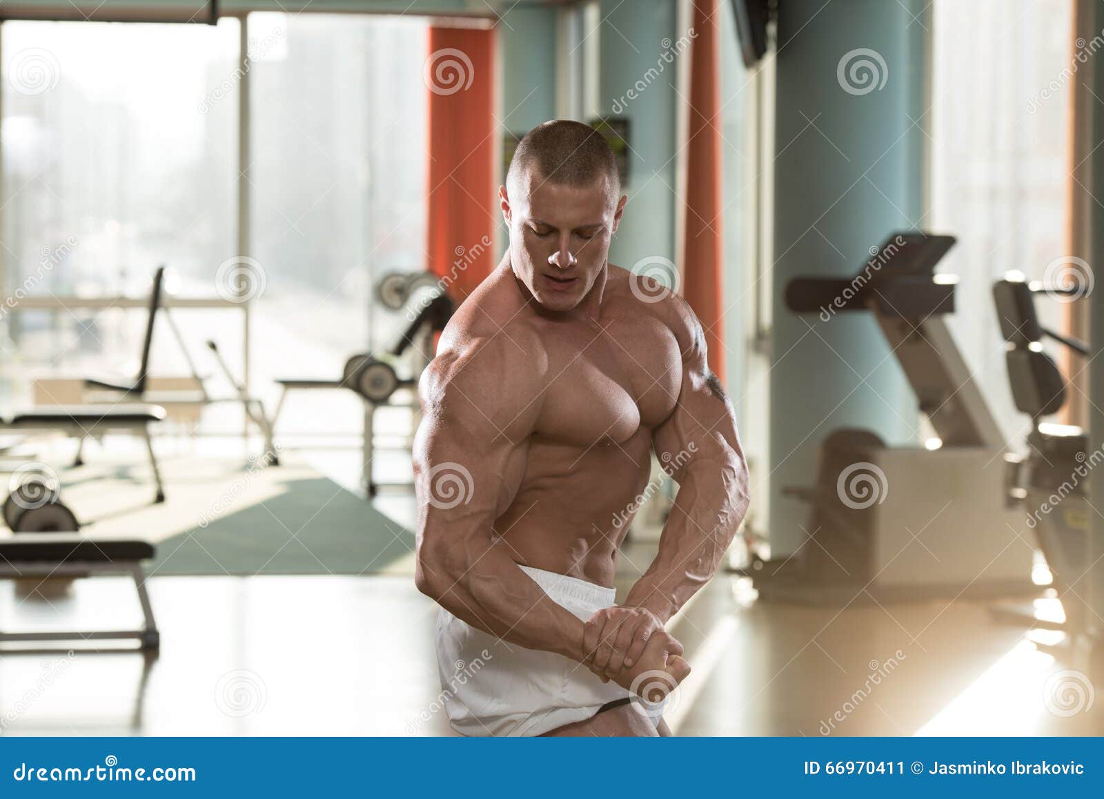 Bodybuilder Performing Side Chest Pose Stock Image - Image of ...