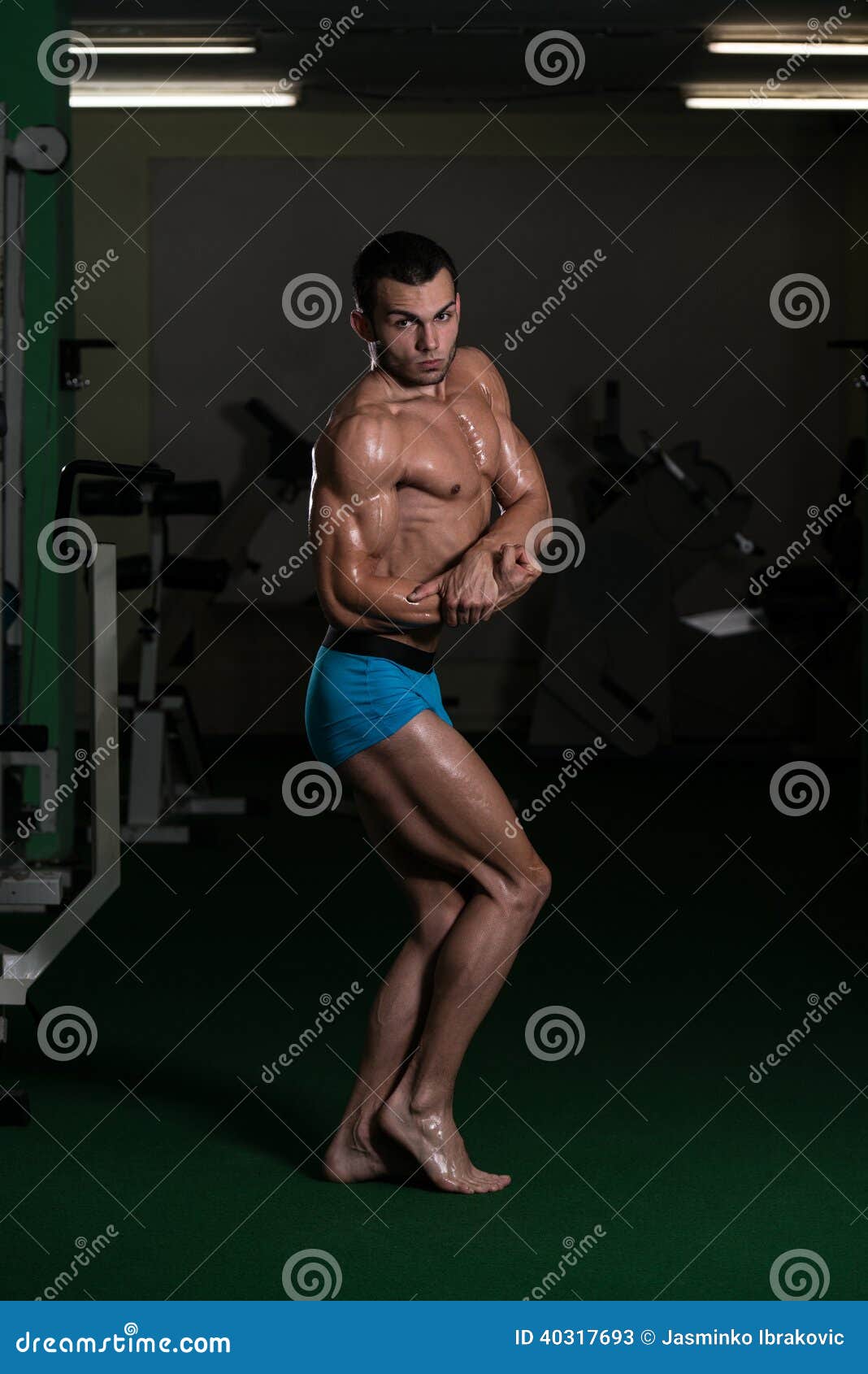 Bodybuilder Performing Side Chest Poses Stock Image - Image of muscle ...