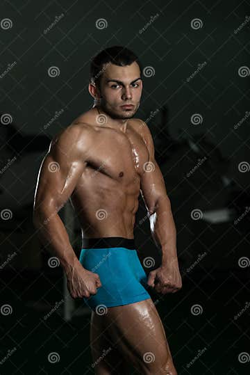 Bodybuilder Performing Side Chest Poses Stock Image - Image of flexing ...