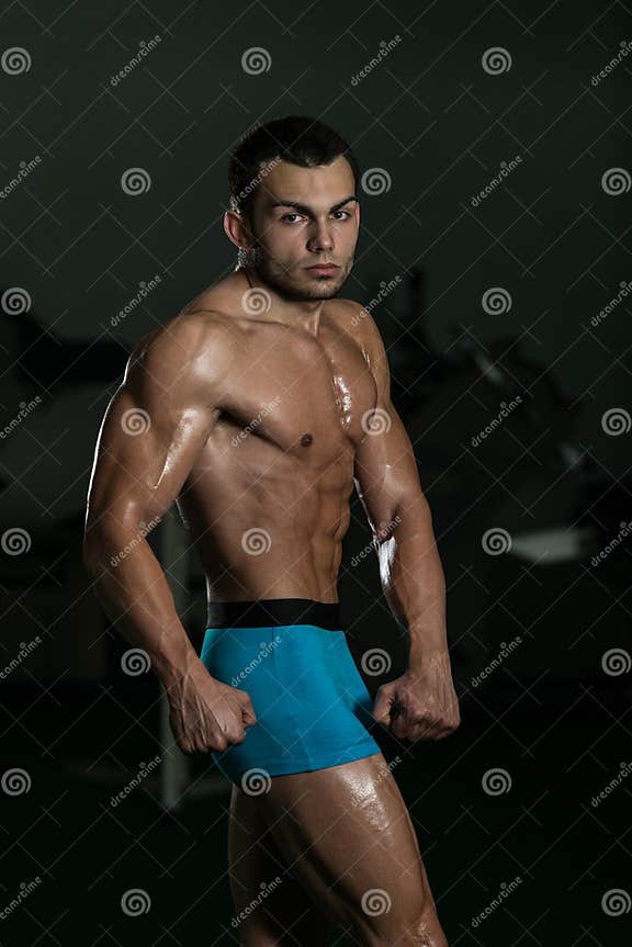 Bodybuilder Performing Side Chest Poses Stock Image - Image of flexing ...