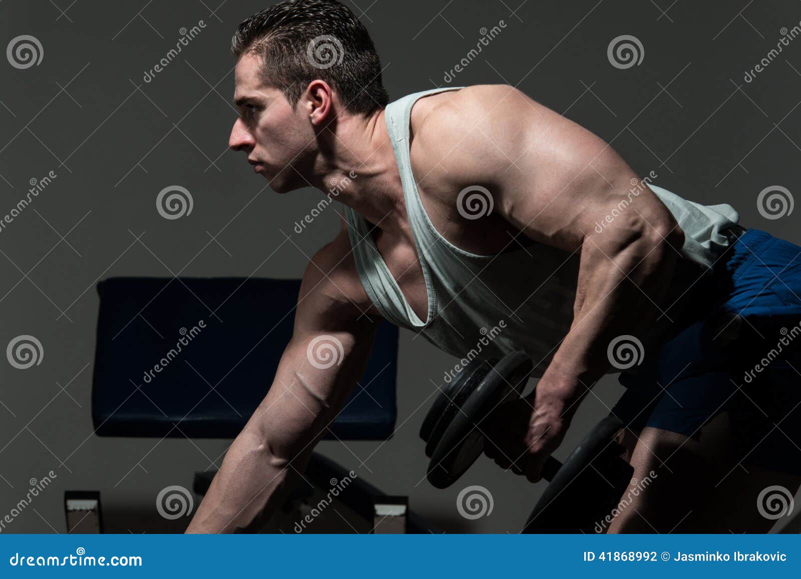 Bodybuilder Performing Triceps with a Dumbbell Stock Photo - Image of ...