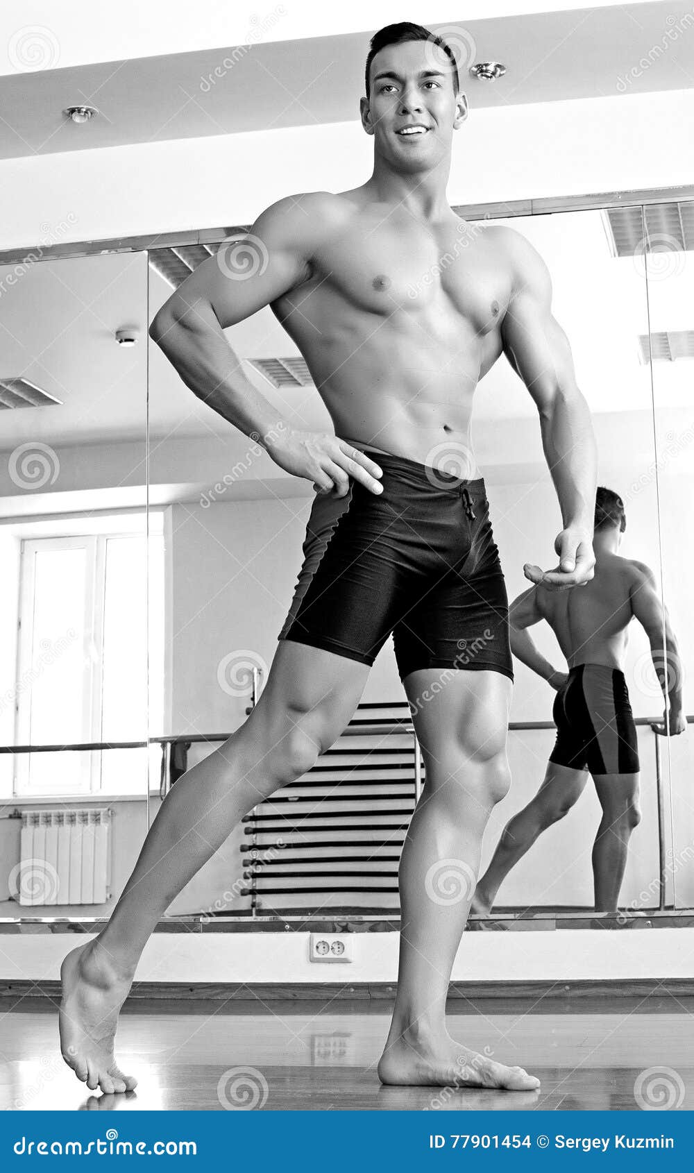 Bodybuilder Posing In Front A Mirror. Royalty-Free Stock Image ...
