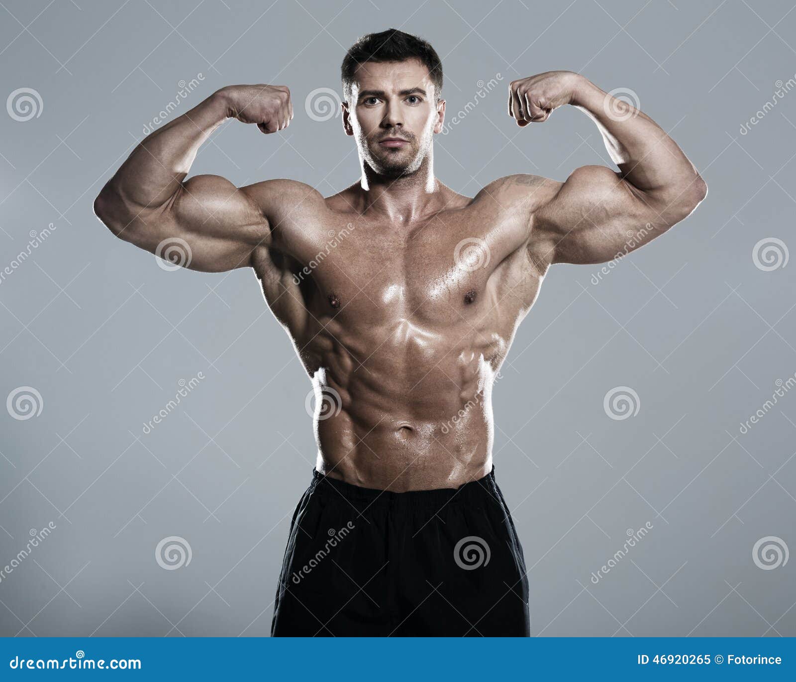 Bodybuilder Posing Stock Image | CartoonDealer.com #46920265