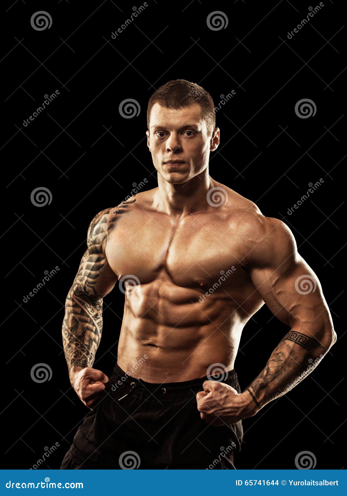 Bodybuilder posing. stock photo. Image of pectoral, dumbbell - 65741644