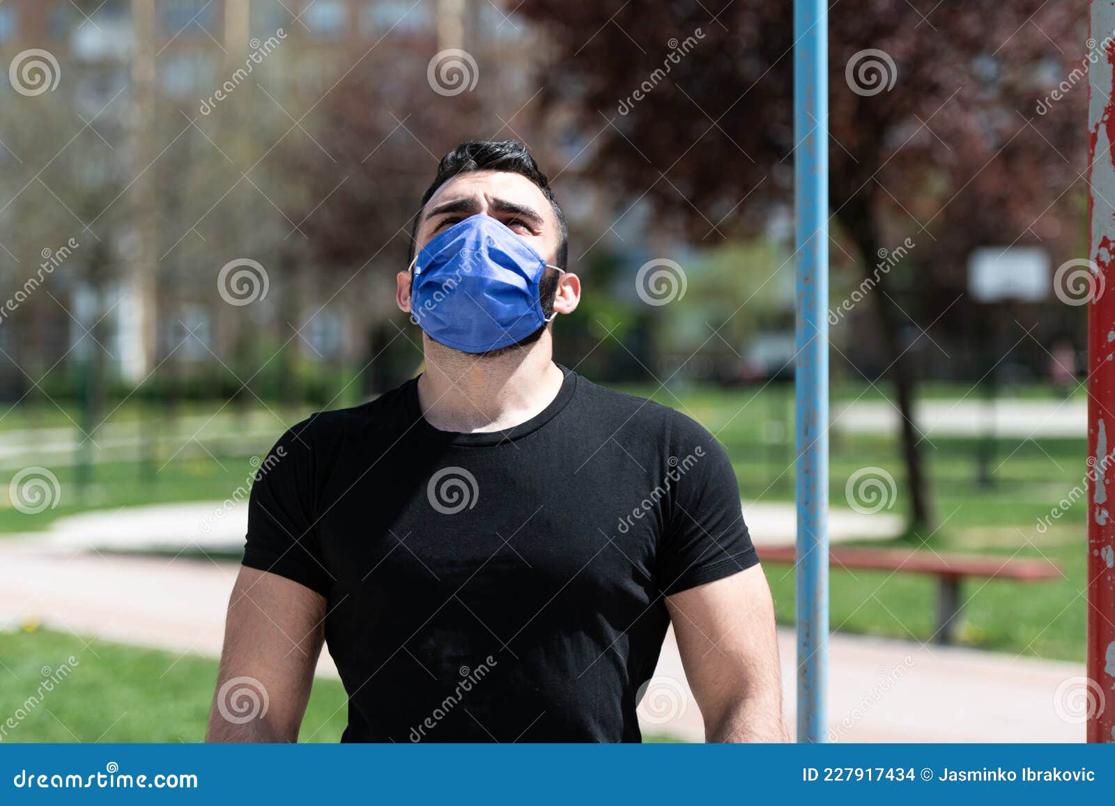 Bodybuilder Posing Outdoors and Wearing Protective Mask Stock Photo ...