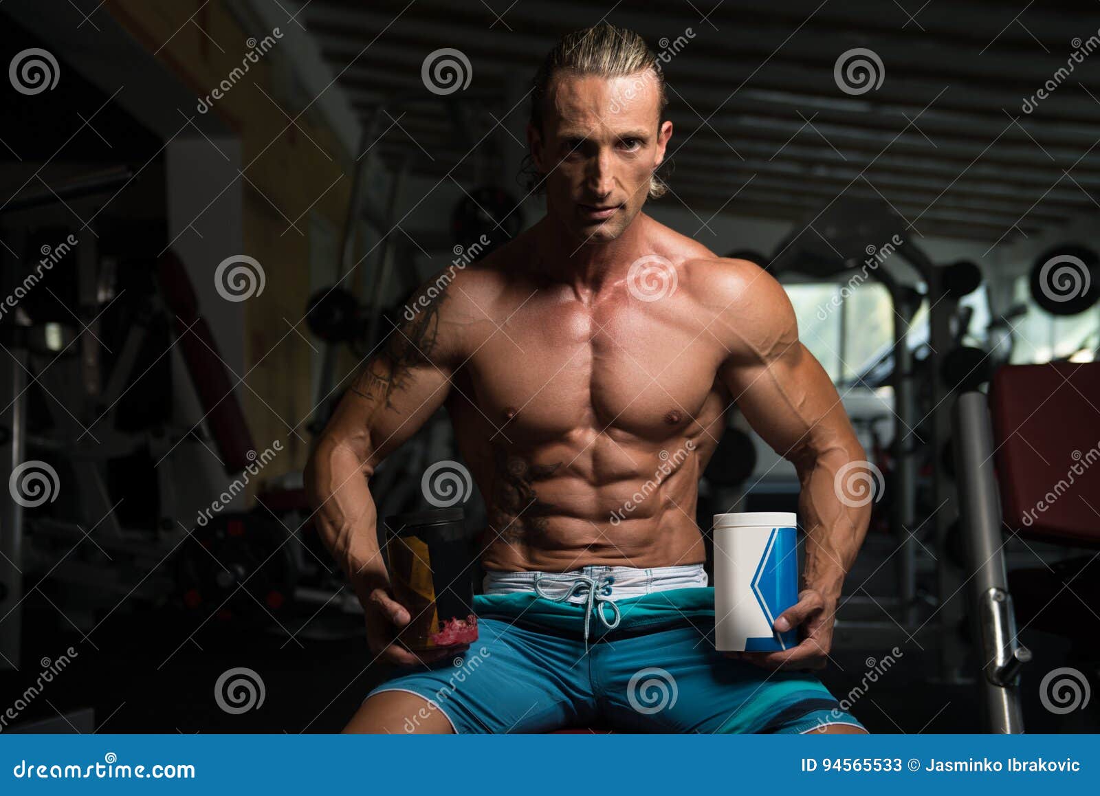 Bodybuilder Posing with Supplements for Copy Space Stock Image - Image ...