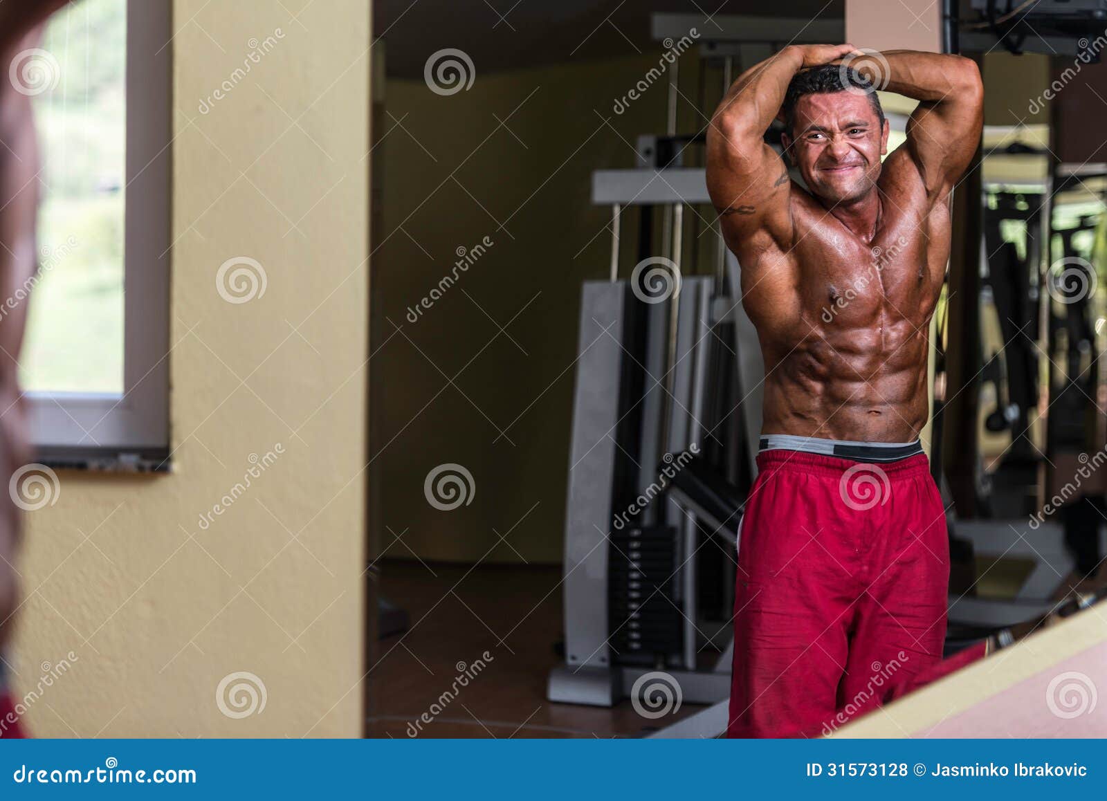 Bodybuilder Showing Abs in Gym Stock Photo - Image of energy, exercise ...