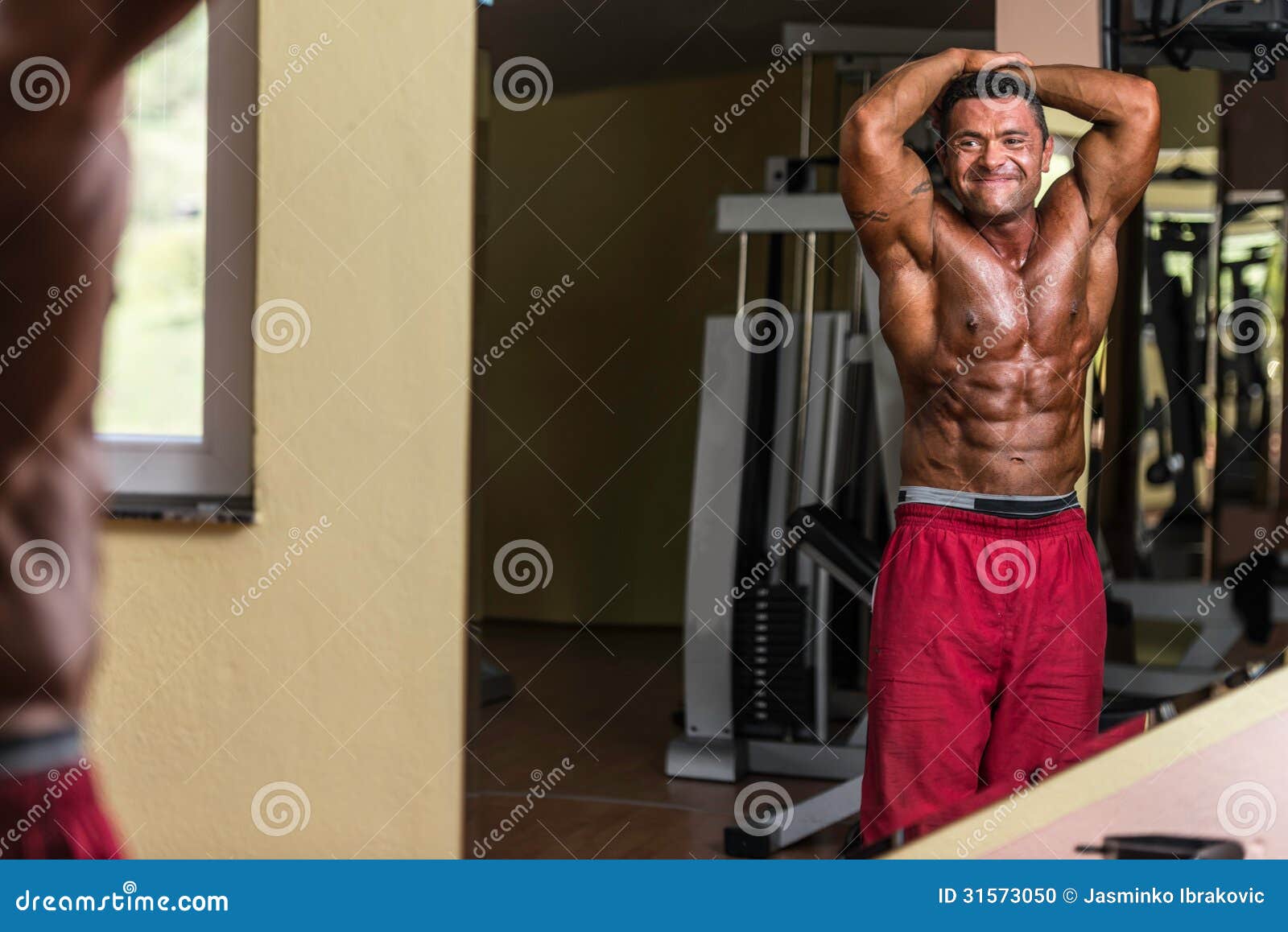 Bodybuilder Showing Abs at the Mirror Stock Photo - Image of athlete ...