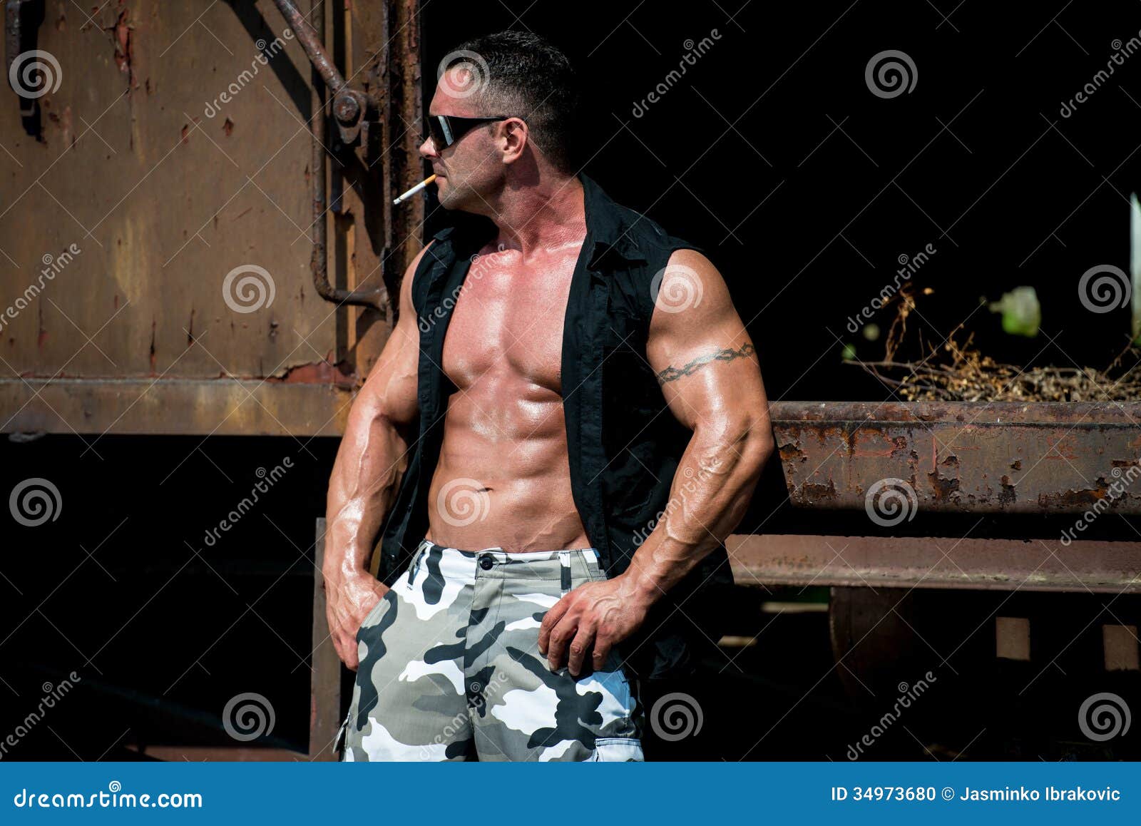 Bodybuilder Smoking a Cigar Stock Photo - Image of looking, cool: 34973680