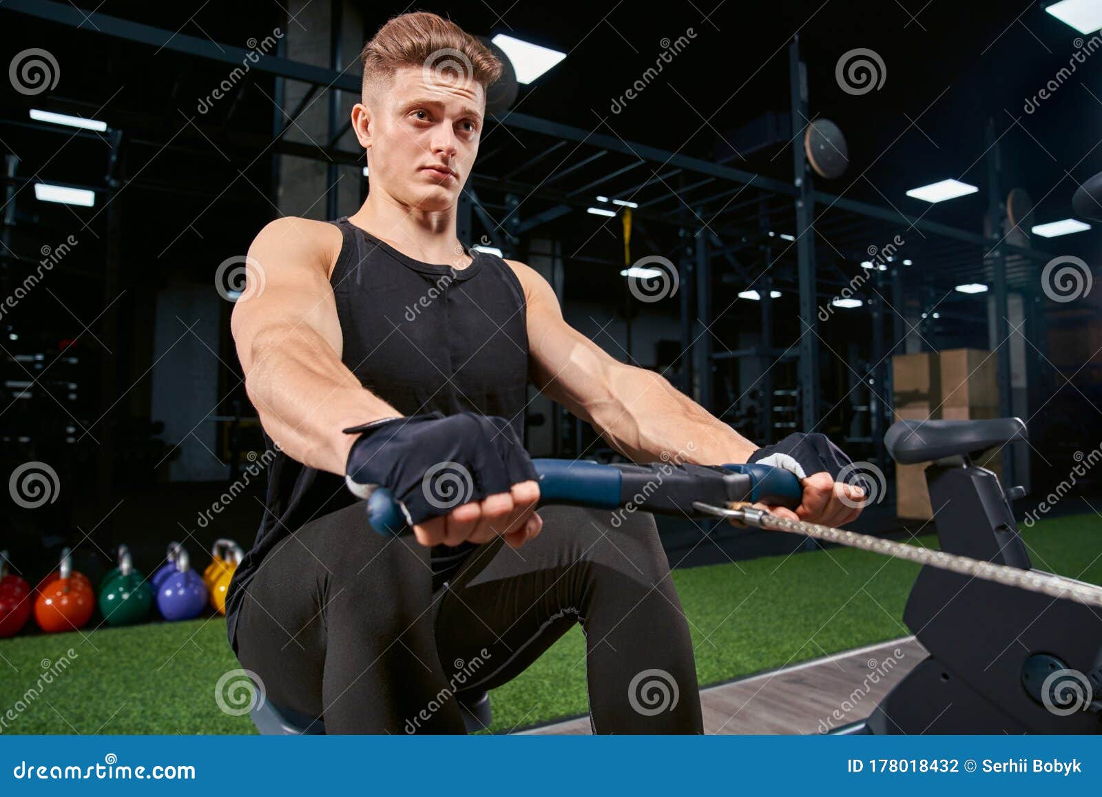 Bodybuilder Training Back on Exercise Machine. Stock Photo - Image of ...