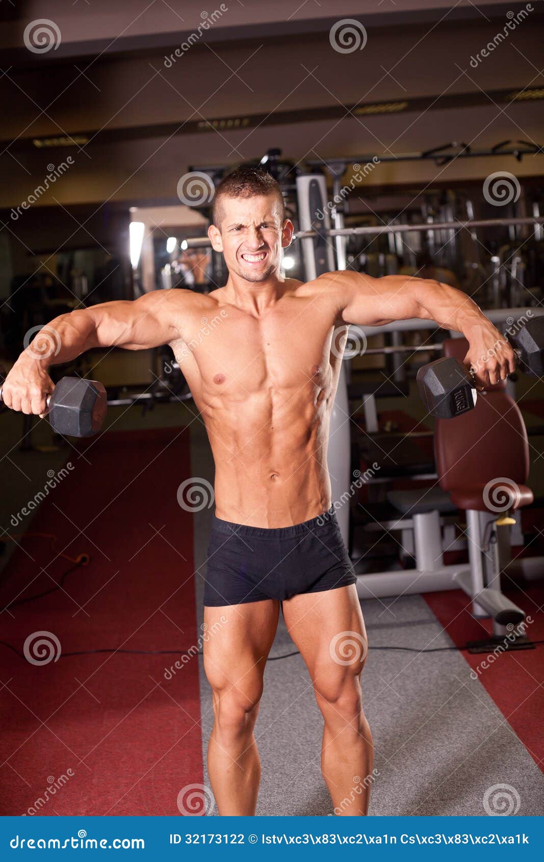 Bodybuilder training stock photo. Image of dumbbell, body - 32173122