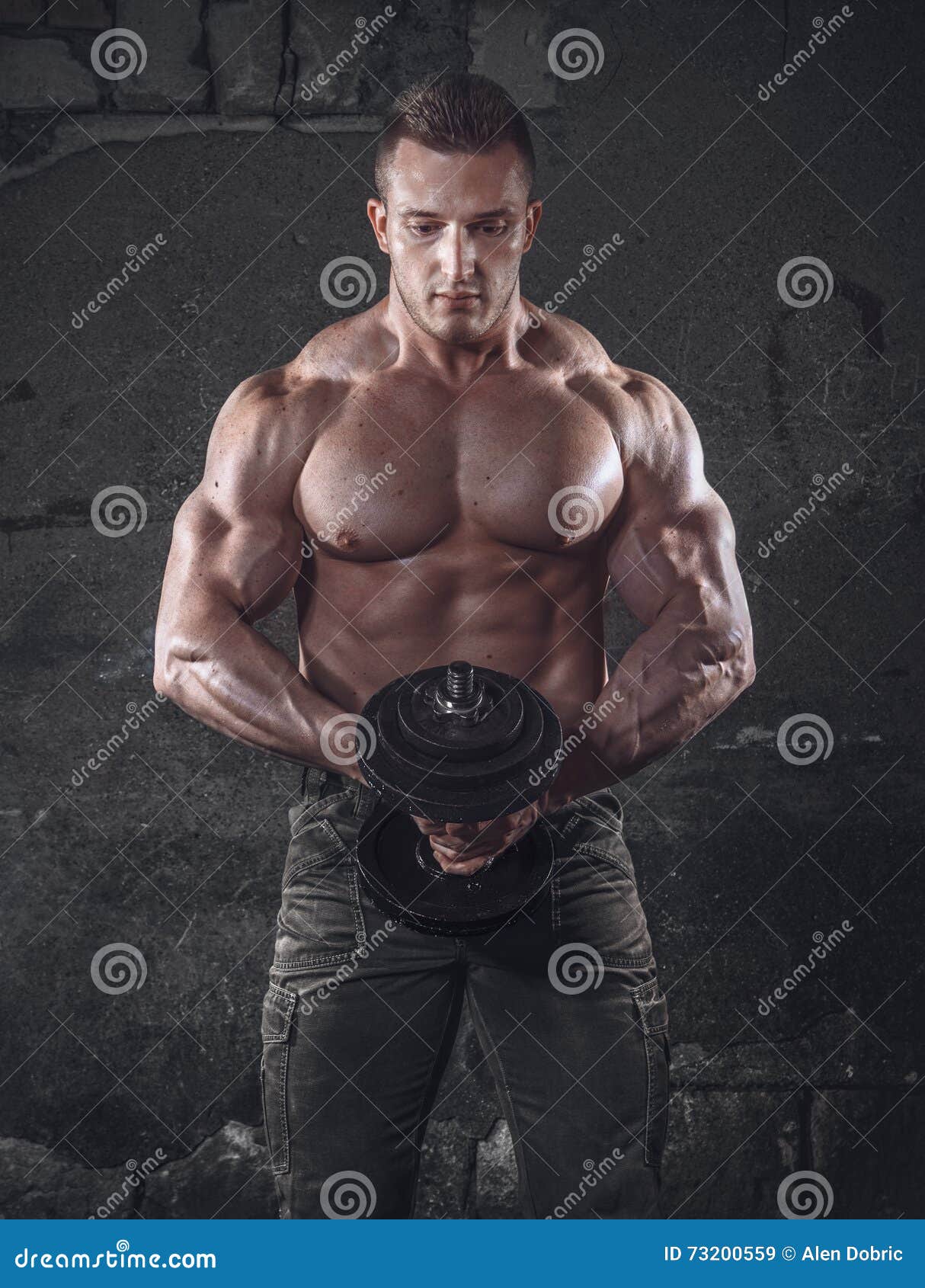Bodybuilder with weight stock image. Image of person - 73200559