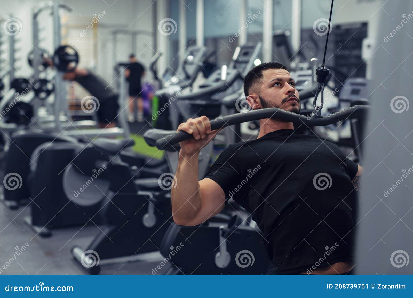 Bodybuilder Working Out in Gym with Determination Stock Image - Image ...