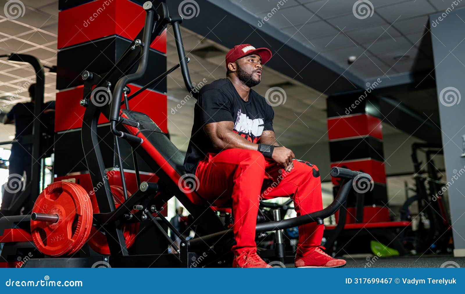 Bodybuilding Training in Gym. Guy Working Out in Modern Gym Stock Image ...