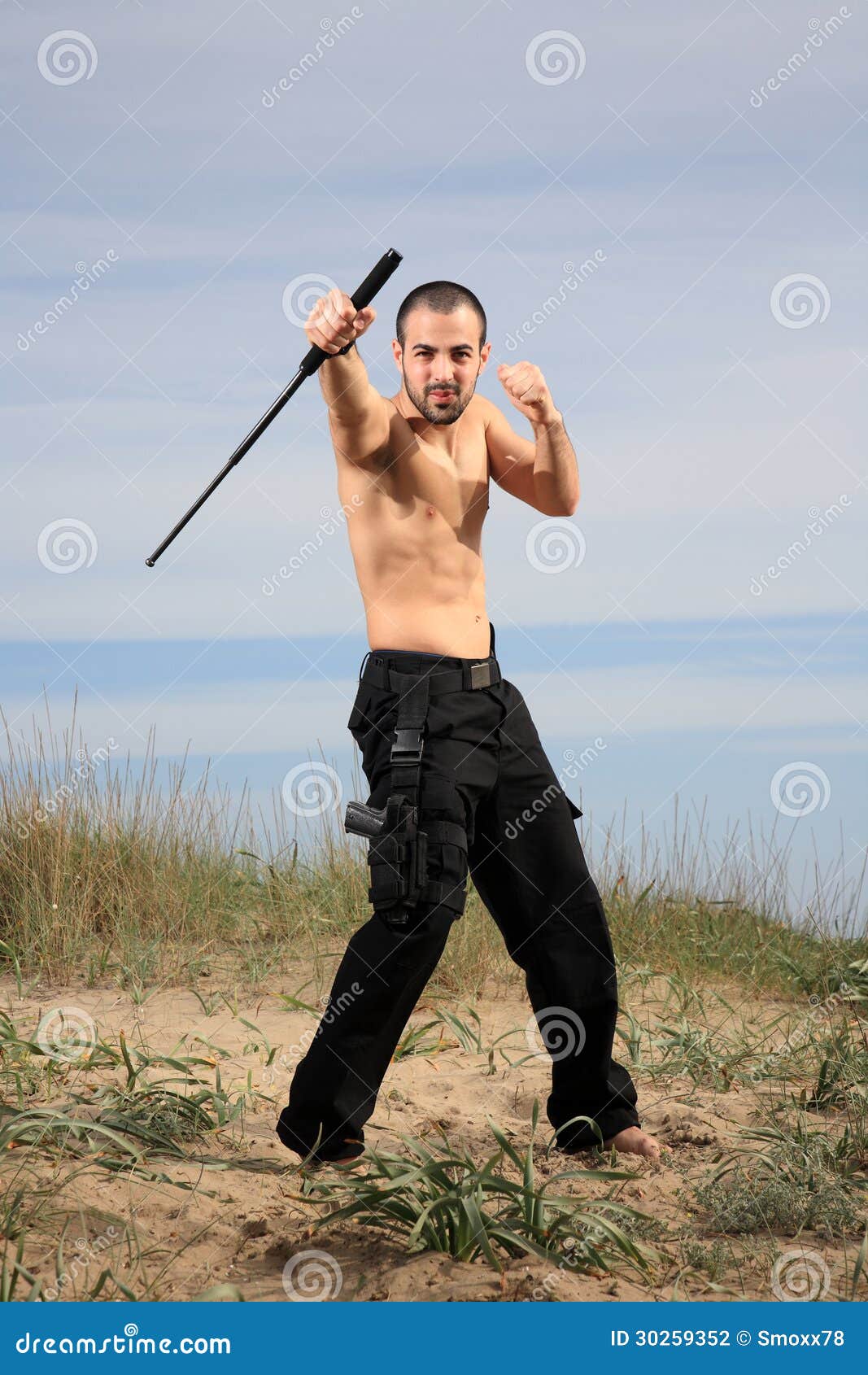 Bodyguard in the sand stock photo. Image of martial, sand - 30259352