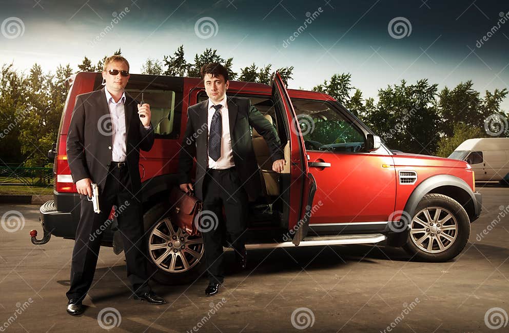 Bodyguard and its boss stock image. Image of black, glasses - 22841939