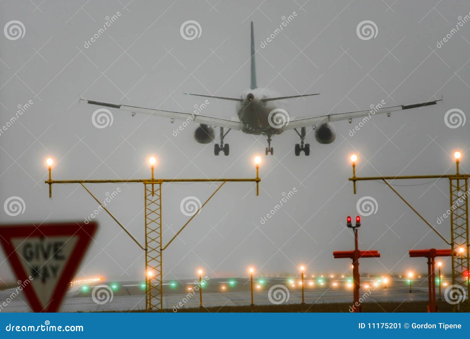 Boeing 767 Landing with Runway Lights on. Stock Image - Image of lights ...