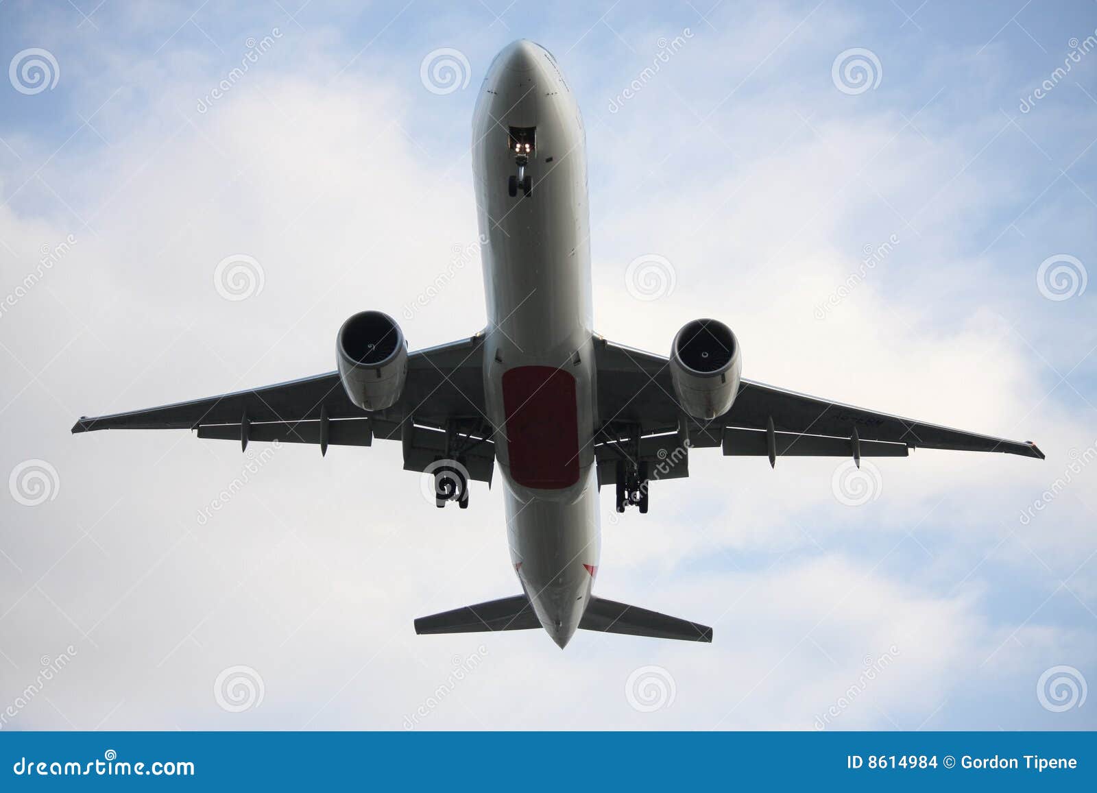 Boeing 777 Flying Low Overhead Stock Photo - Image of arrive, close ...