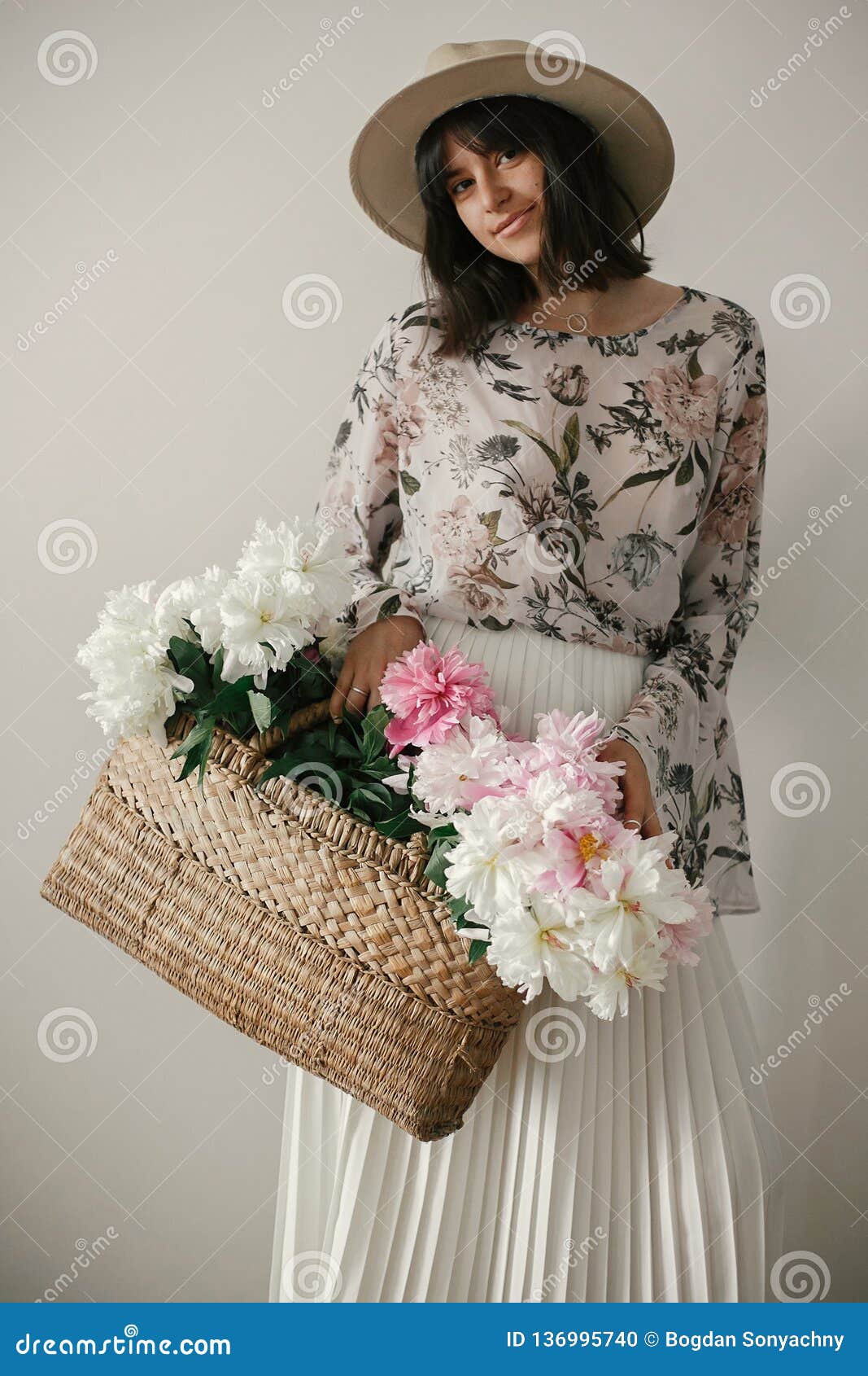 Boho Girl In Hat Holding Pink And White Peonies In Rustic Basket
