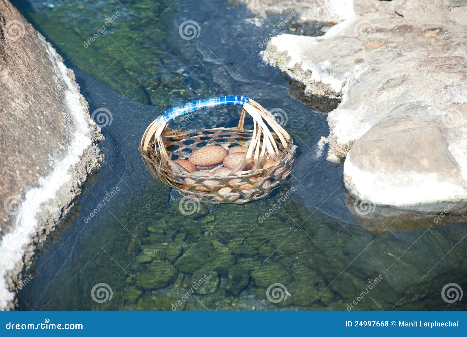 Boil eggs in hot spring . stock photo. Image of food - 24997668