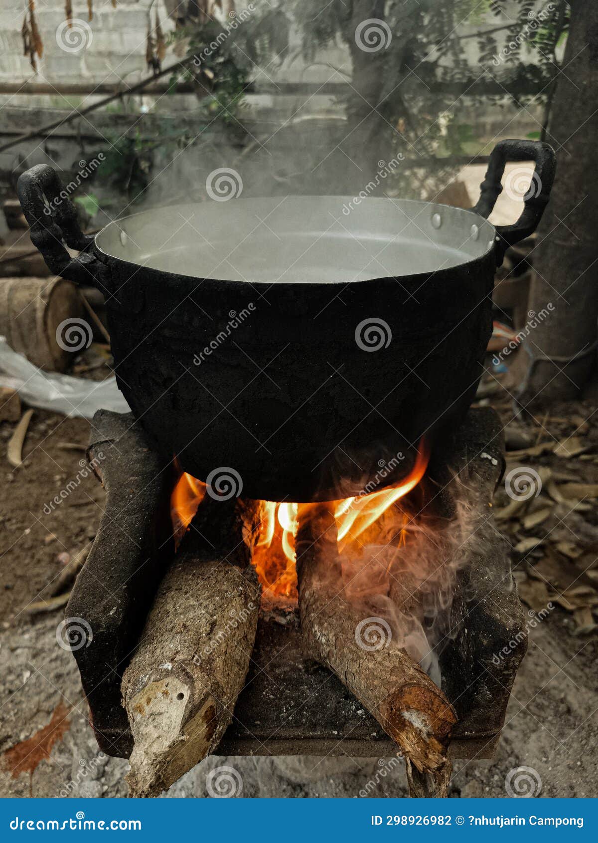 Boil Water To Cook Rice by?using Wood from?trees To?build a?rustic Fire ...
