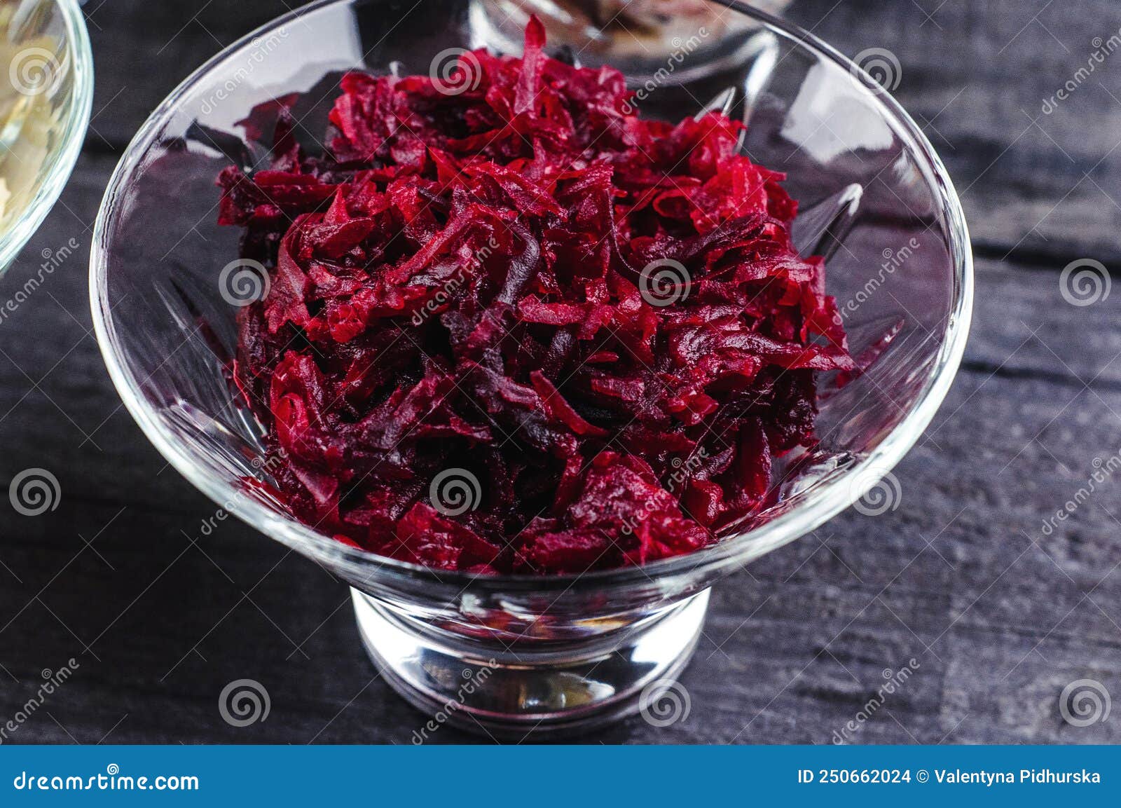 Boiled Beet Shredded in a Transparent Deep Dish on a Wooden Black ...