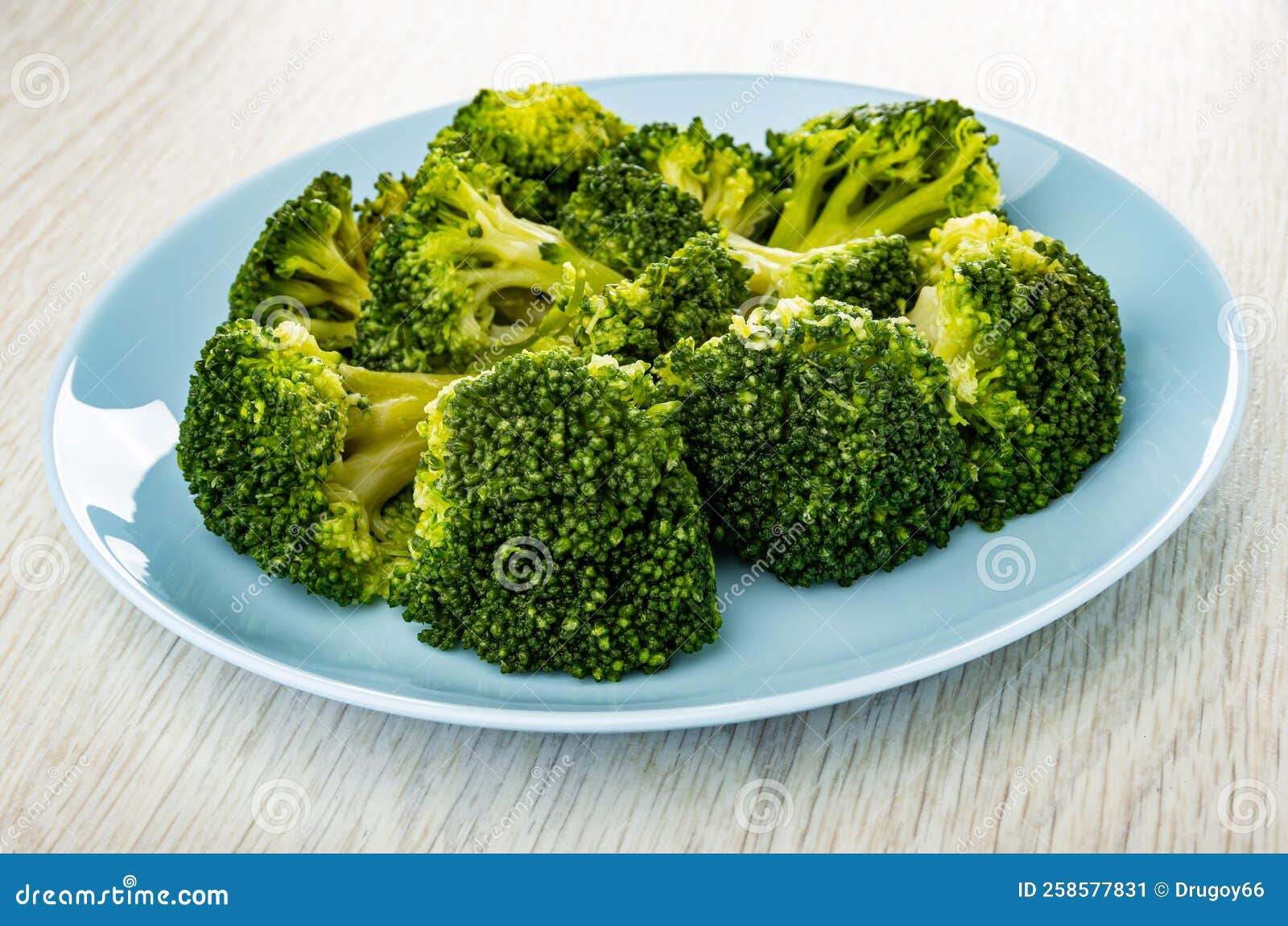 Boiled Broccoli in Blue Plate on Wooden Plate Stock Image - Image of ...