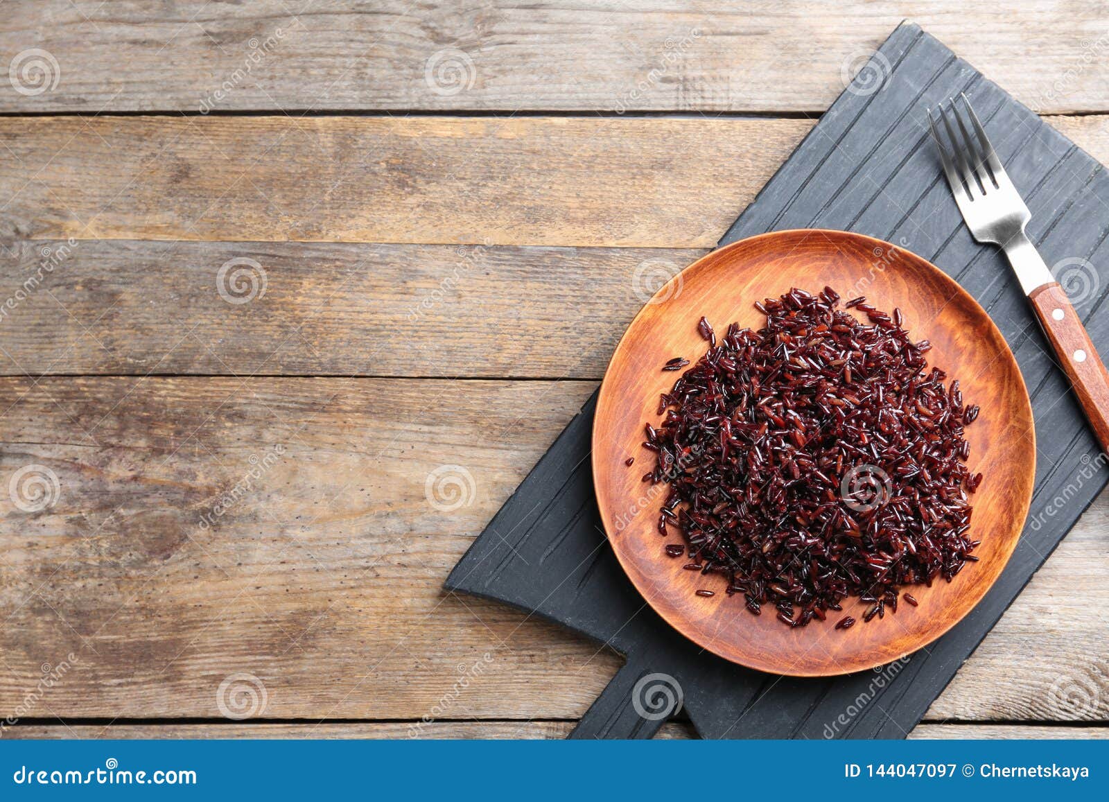 Boiled Brown Rice Served on Wooden Table. Space for Text Stock Image ...