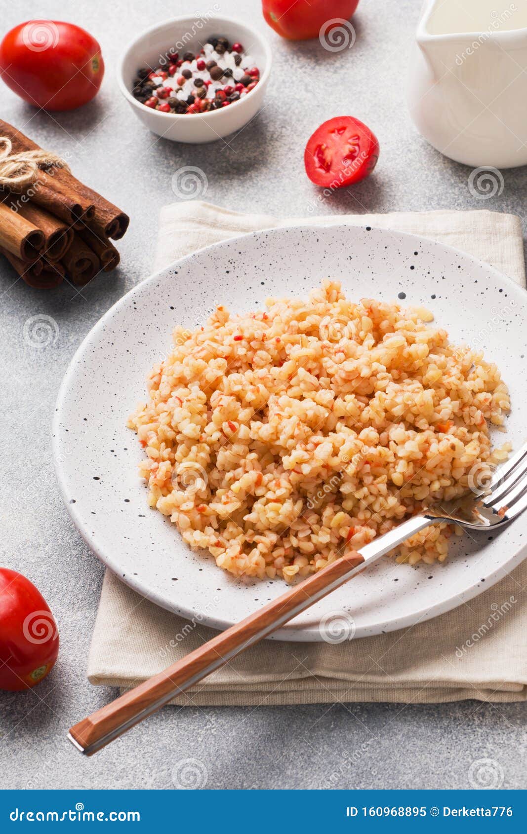 Boiled Bulgur with Tomatoes in a Ceramic Plate Stock Image - Image of ...