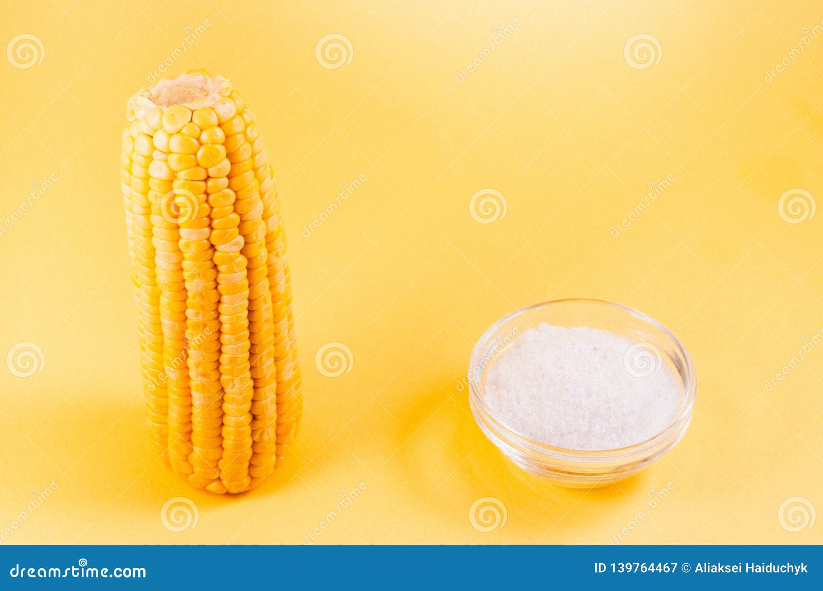 Boiled Corn and Salt on a Yellow Background/boiled Appetizing Corn and ...