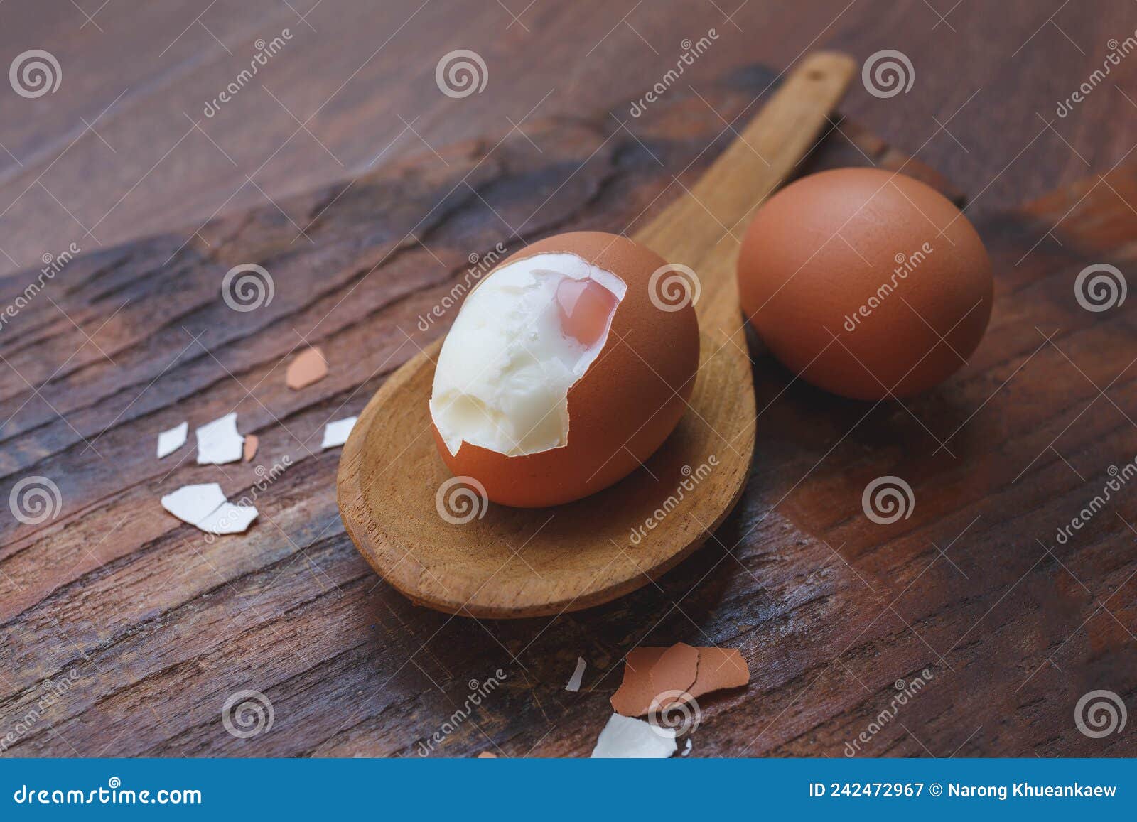 Boiled Eggs with Shells Removed on a Wooden Spoon Stock Image - Image ...