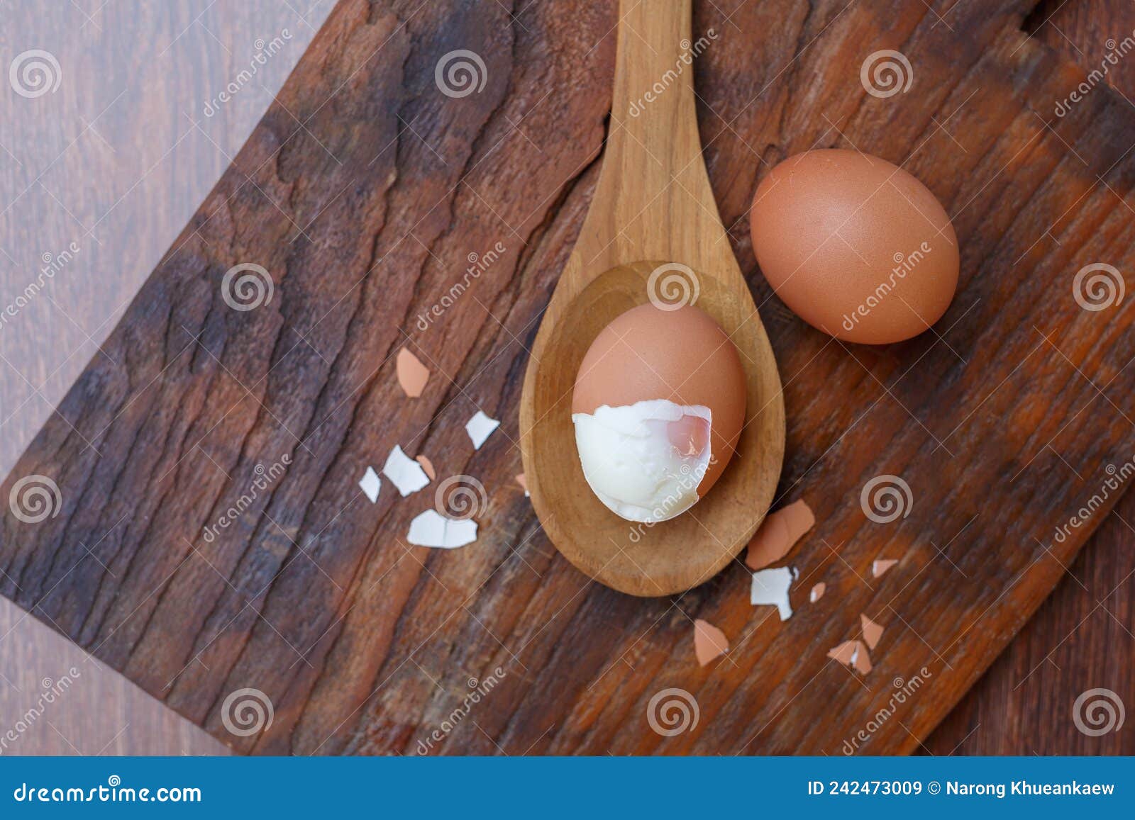 Boiled Eggs with Shells Removed on a Wooden Spoon Stock Image - Image ...