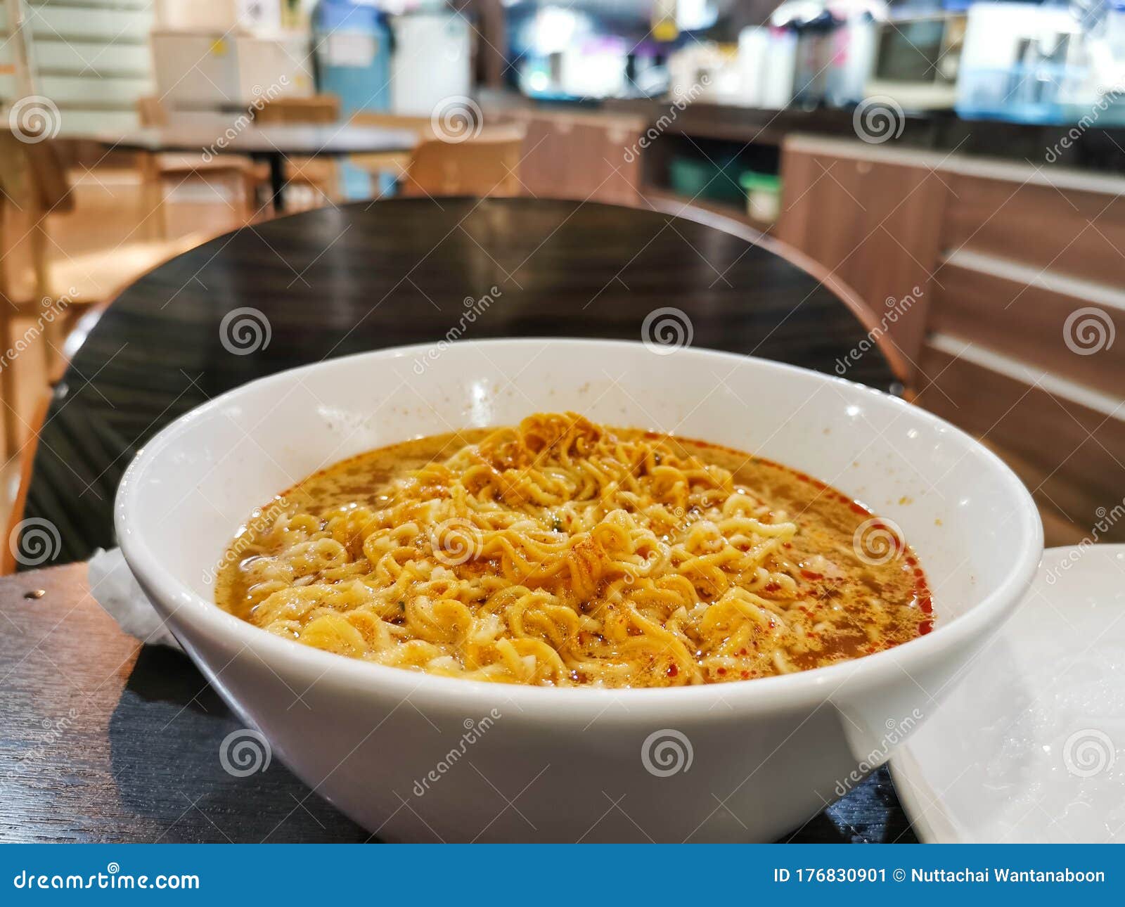 Boiled Instant Noodles, Then Put in a White Cup, Placed on a Brown ...