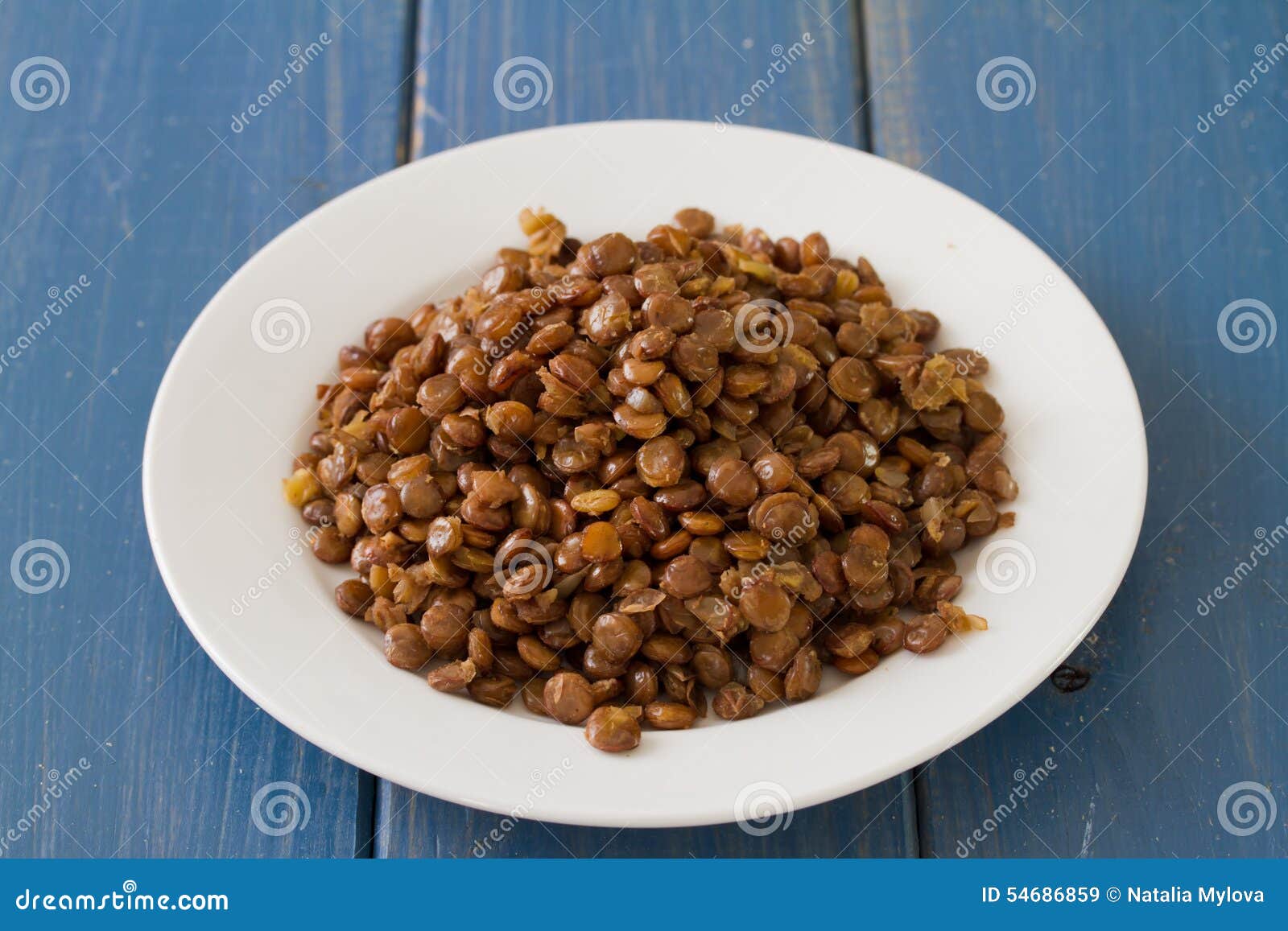Boiled lentil on plate stock image. Image of vegetables - 54686859