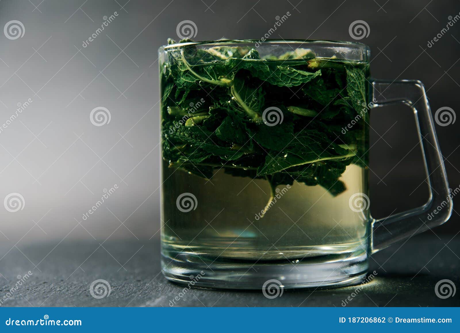 Boiled Mint Leaves in a Glass Mug on a Dark Background Stock Photo ...