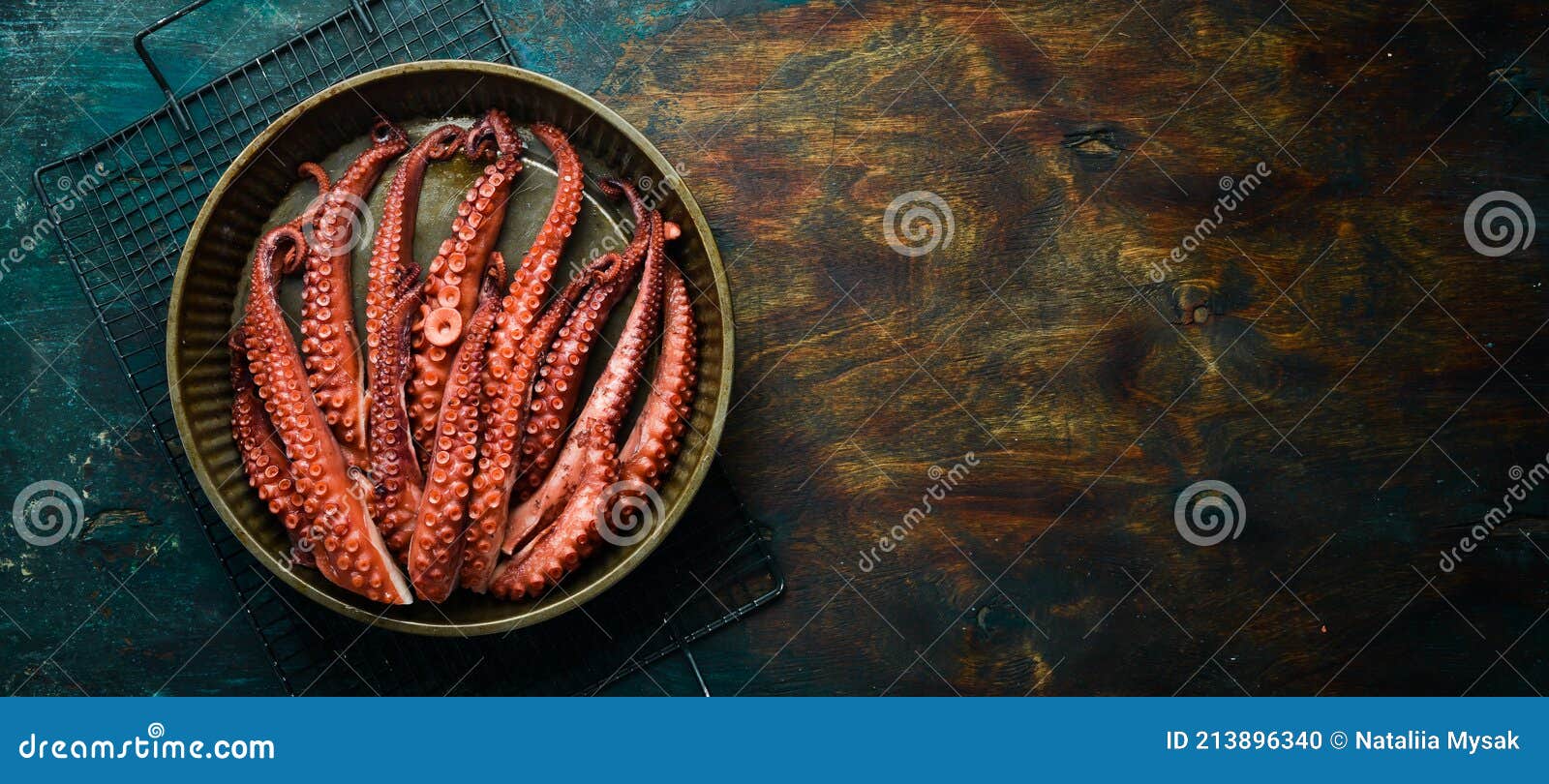 Boiled Octopus in a Round Metal Baking Dish. Seafood Stock Photo ...