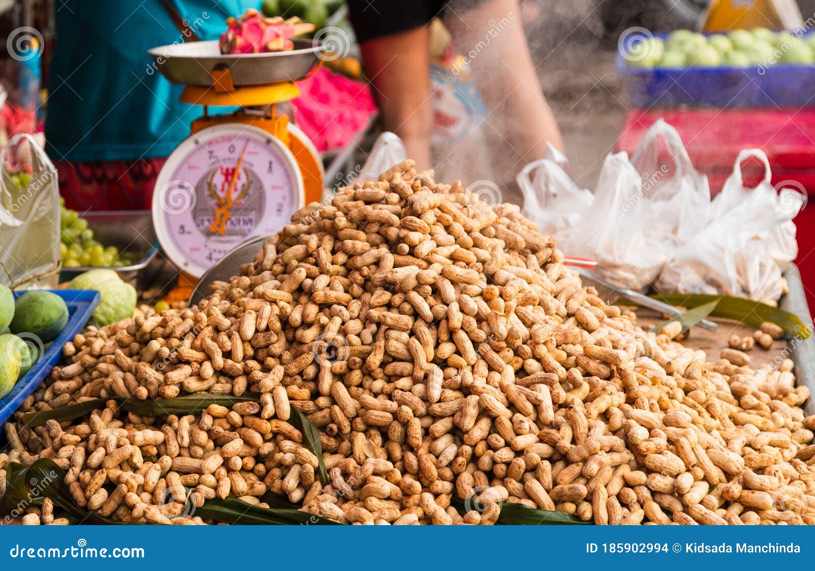 Boiled Peanuts In Wooden Cup On Crumpled Paper Royalty-Free Stock ...