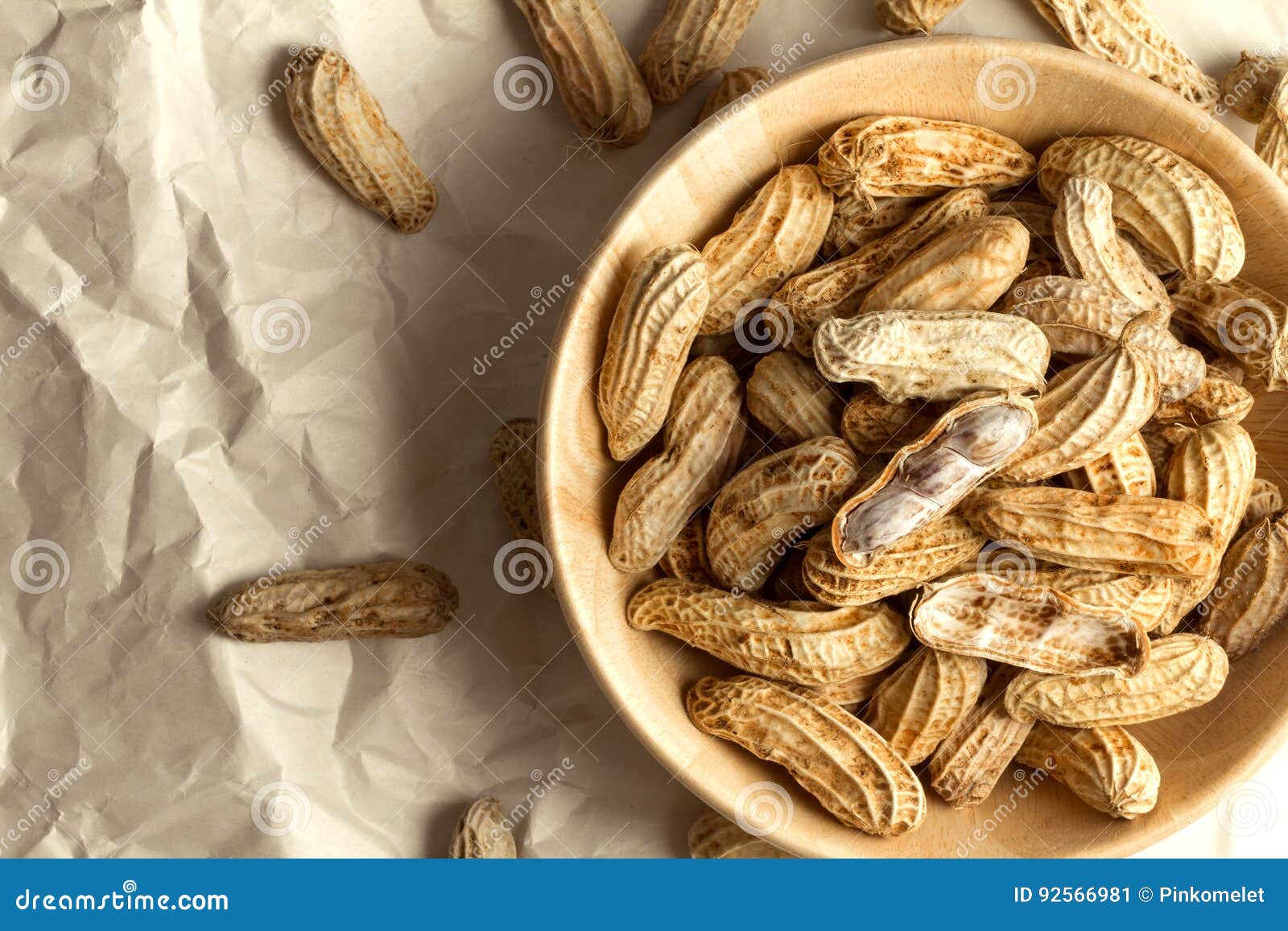 Boiled Peanuts In Wooden Cup On Crumpled Paper Stock Image ...