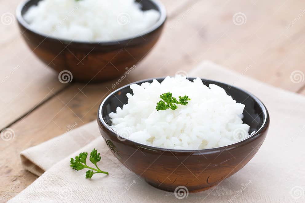 Boiled rice in a bowl stock image. Image of grain, cuisine - 61752697