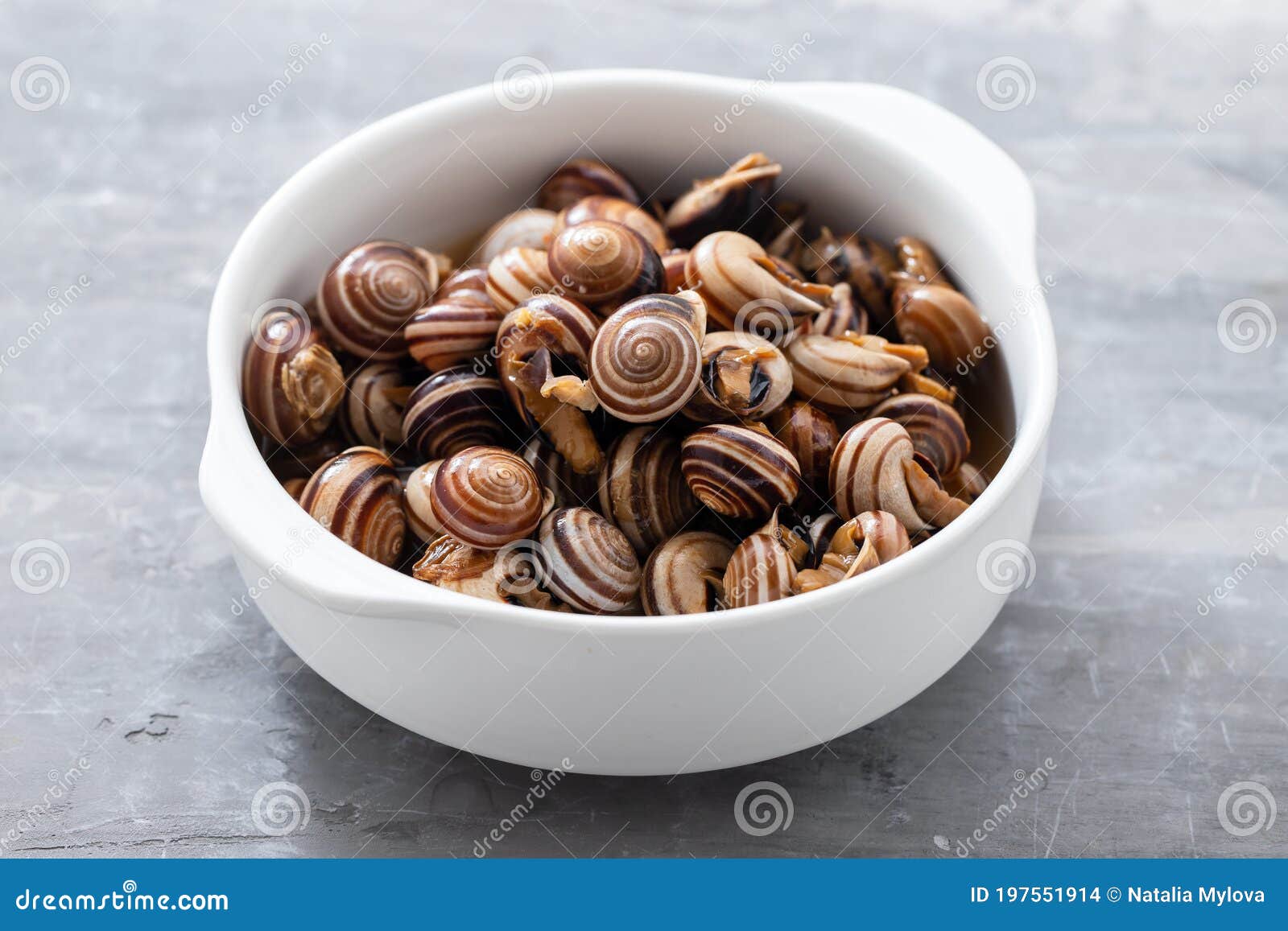 Boiled Snails in the White Bowl on Ceramic Background Stock Photo ...